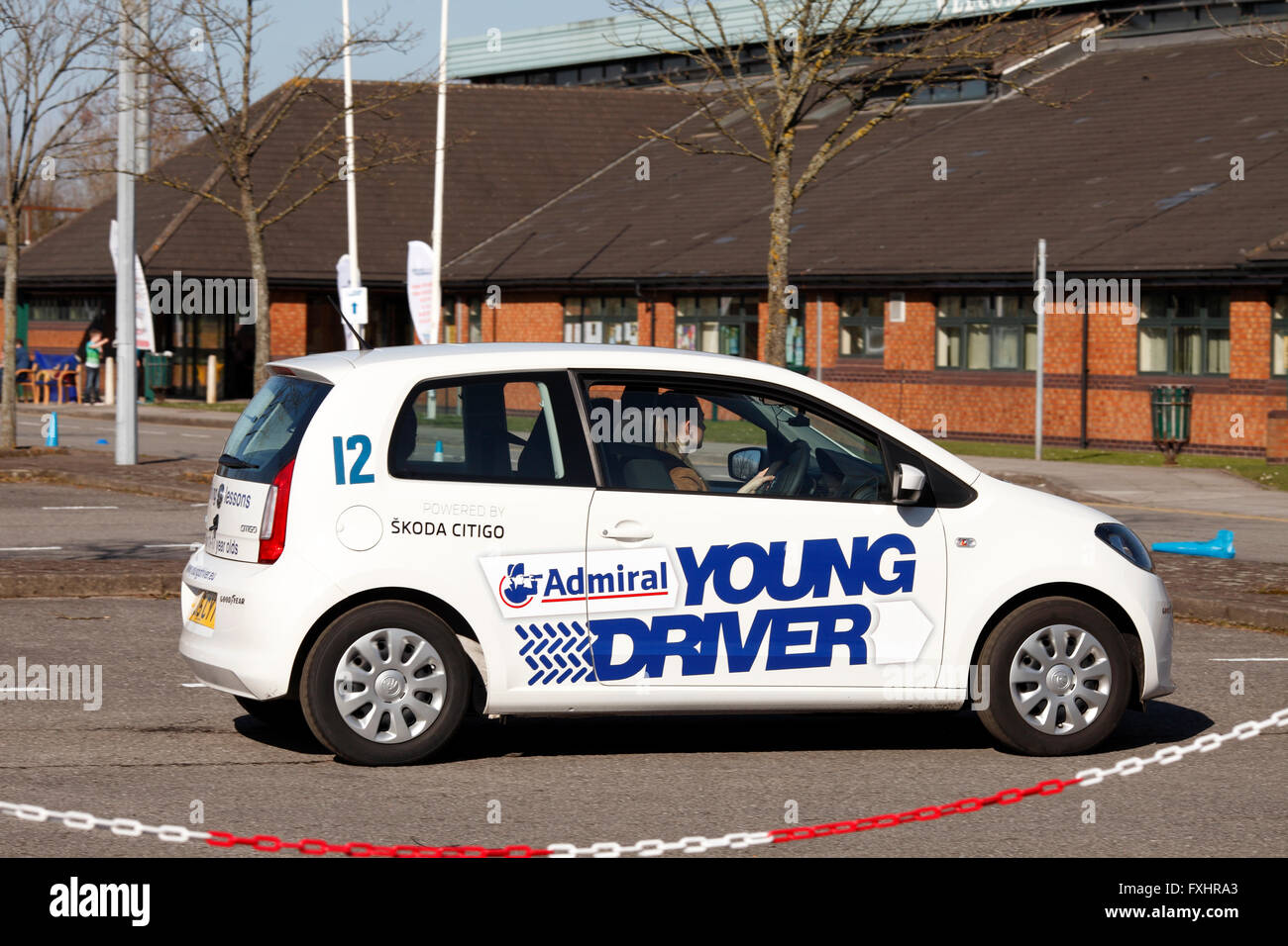 Young girl learning to drive on the Admiral Young driver car scheme for ...