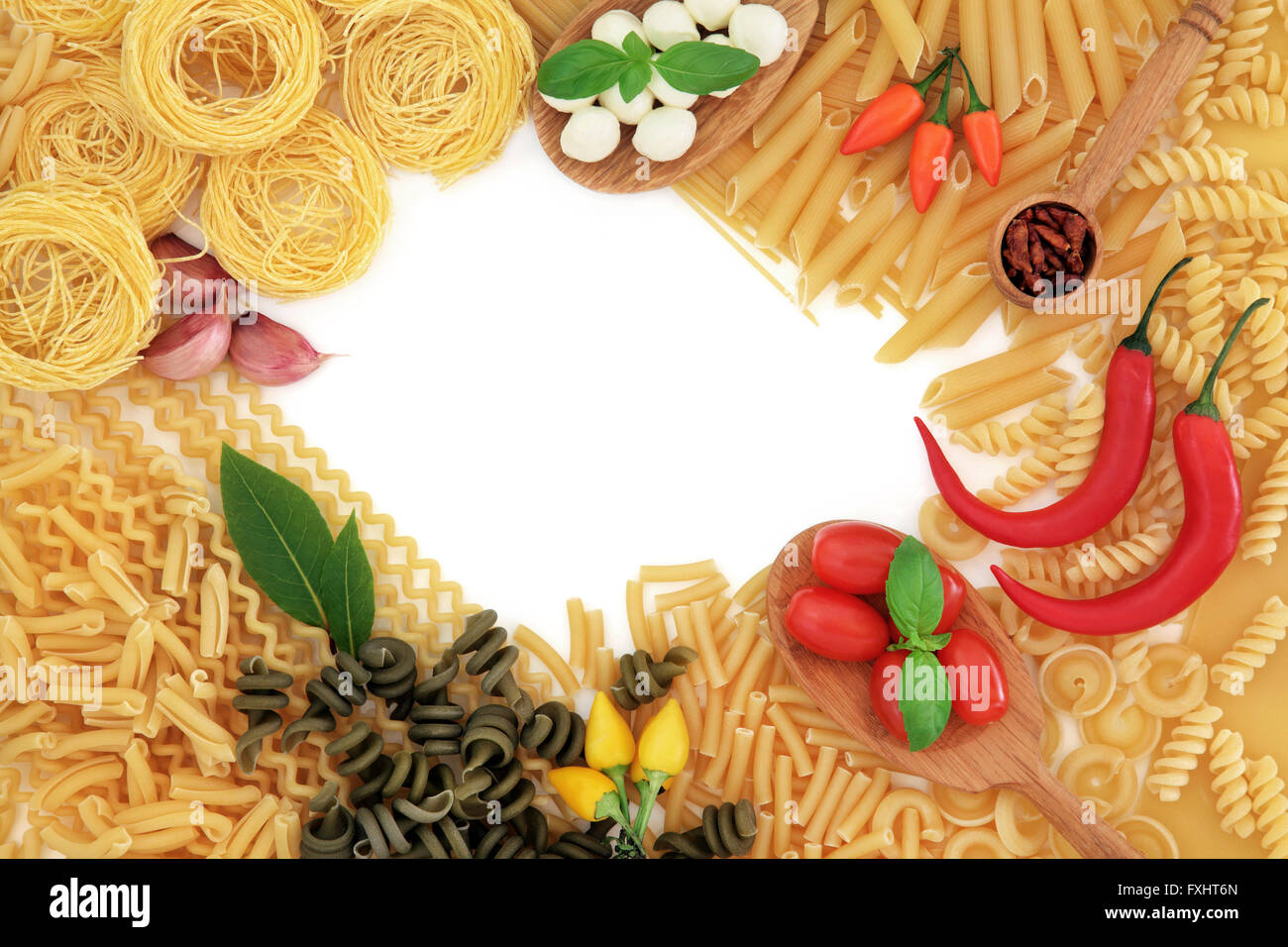 Italian pasta and food ingredients forming an abstract border over ...