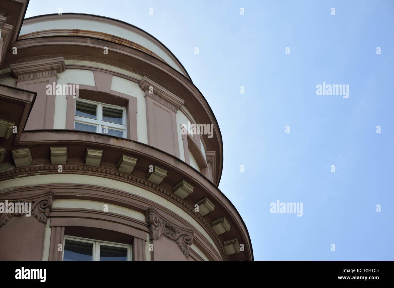 Details of renovated facade of oval building under clear sky Stock ...