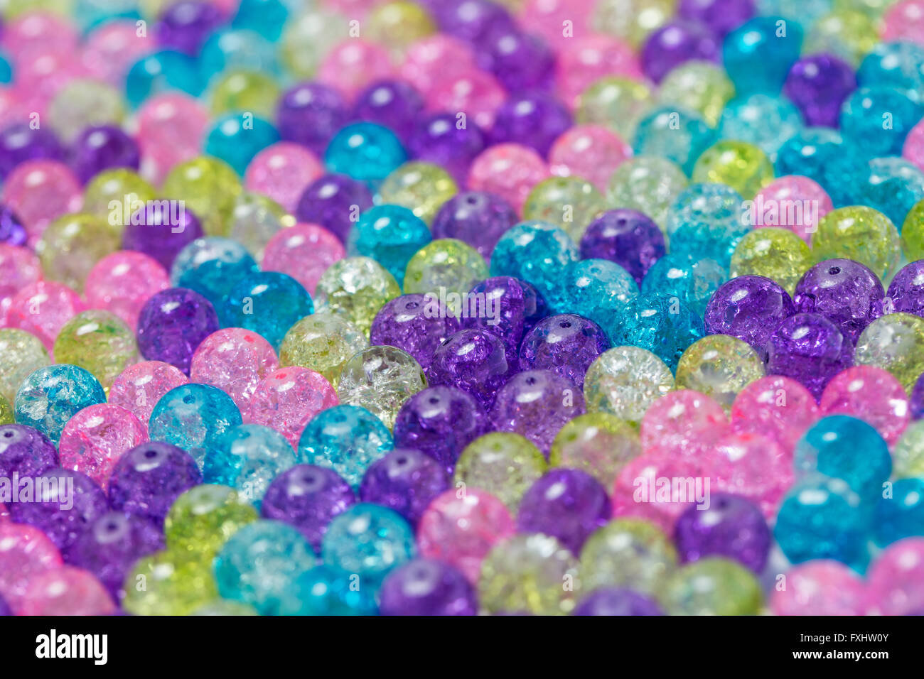 Pattern of rounded colorful quartz stones Stock Photo - Alamy