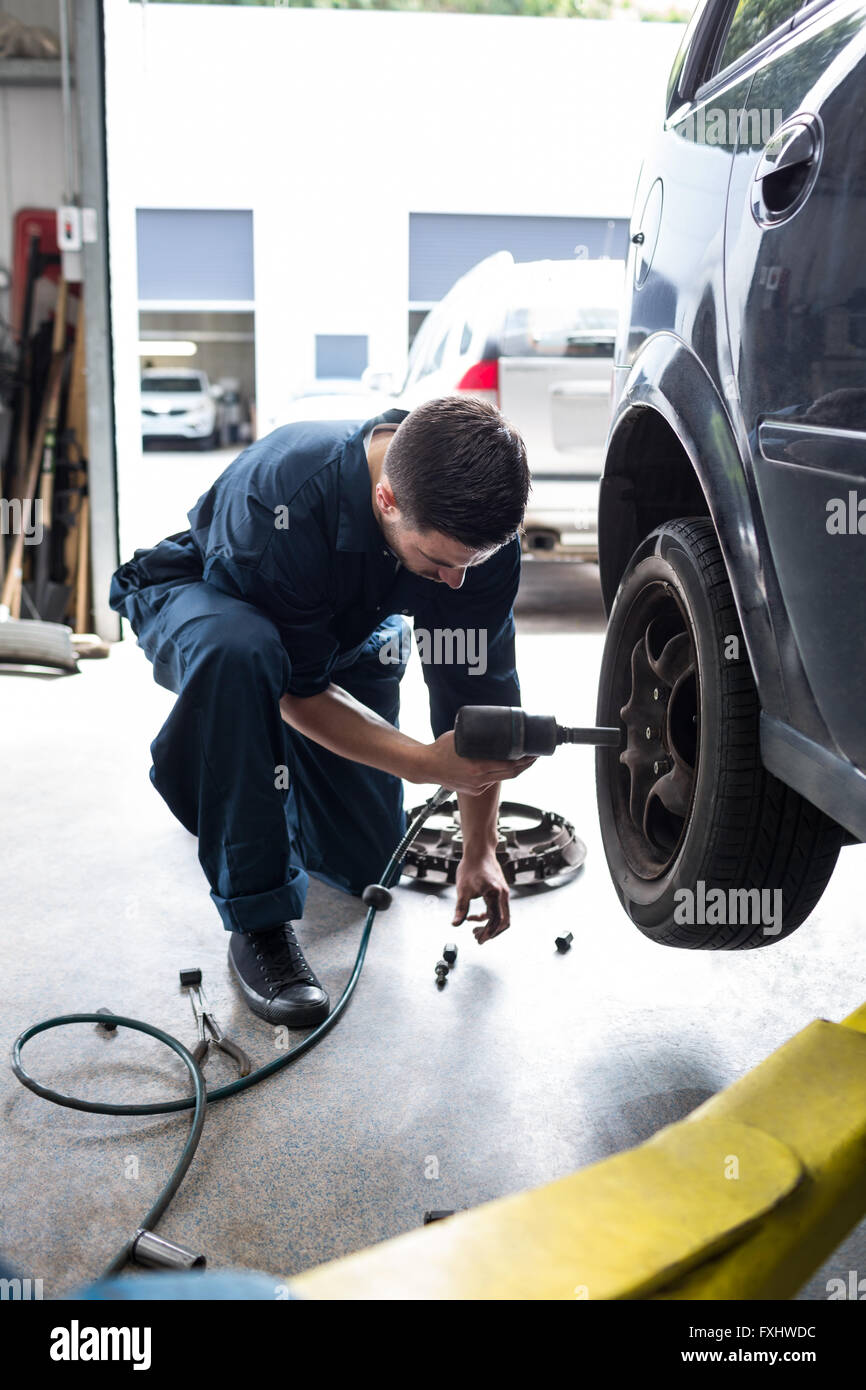 Changing the wheel hi-res stock photography and images - Alamy