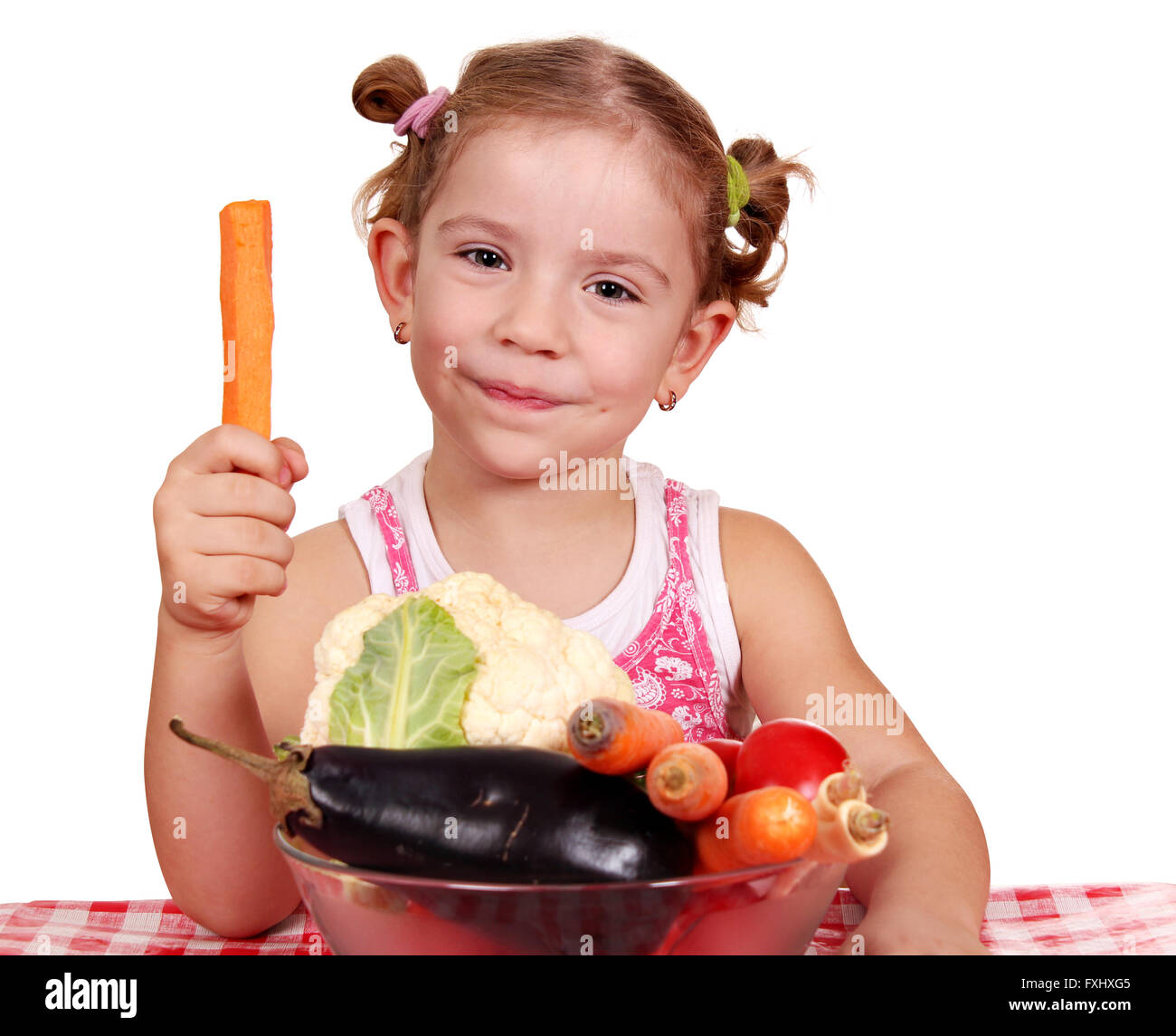 beauty little girl with vegetables Stock Photo - Alamy