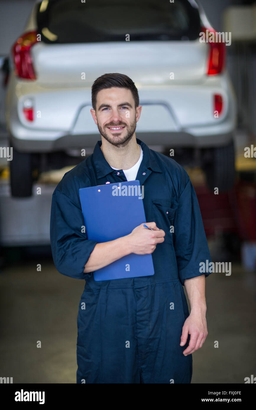 Mechanic looking camera holding hi-res stock photography and images - Alamy