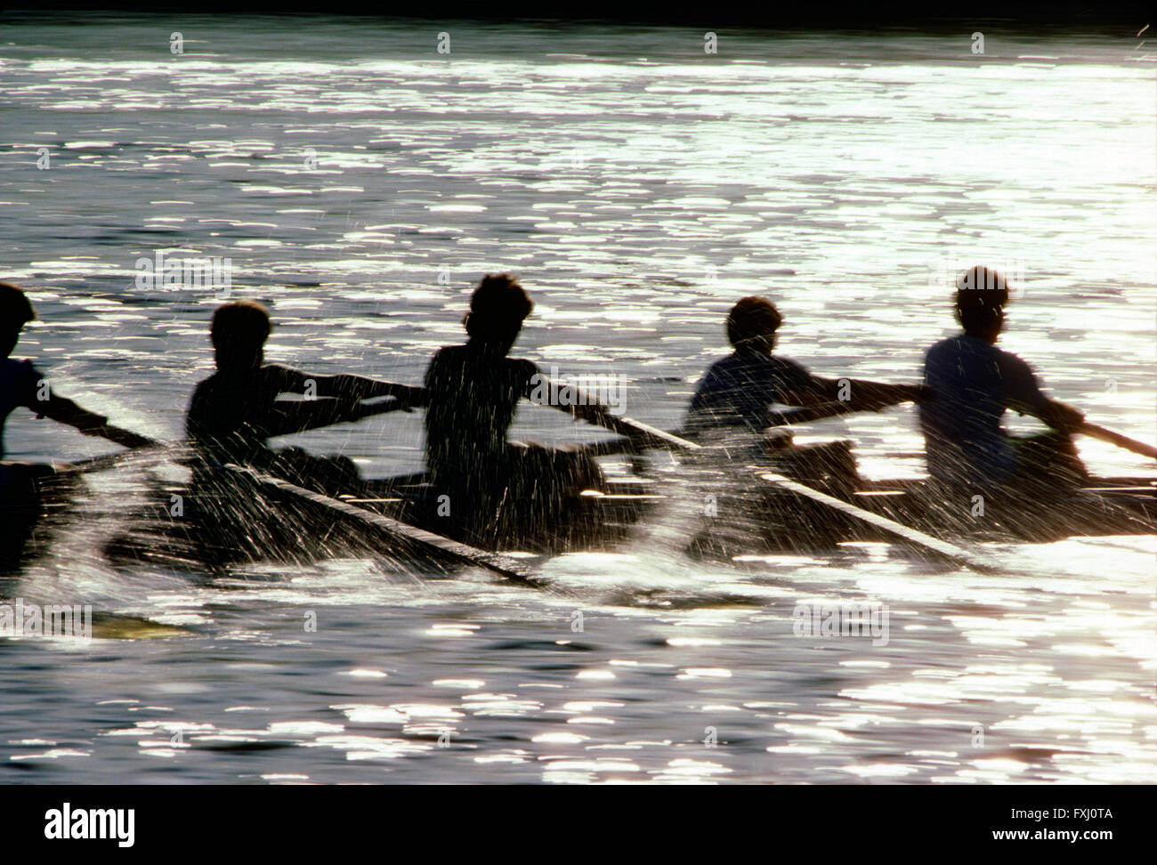 Motion blur pan view of scullers rowing in the Head of the Schuylkill ...