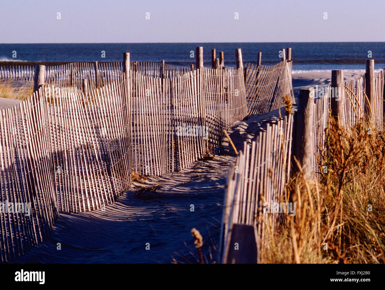 Wooden storm fencing along sand hi-res stock photography and images - Alamy