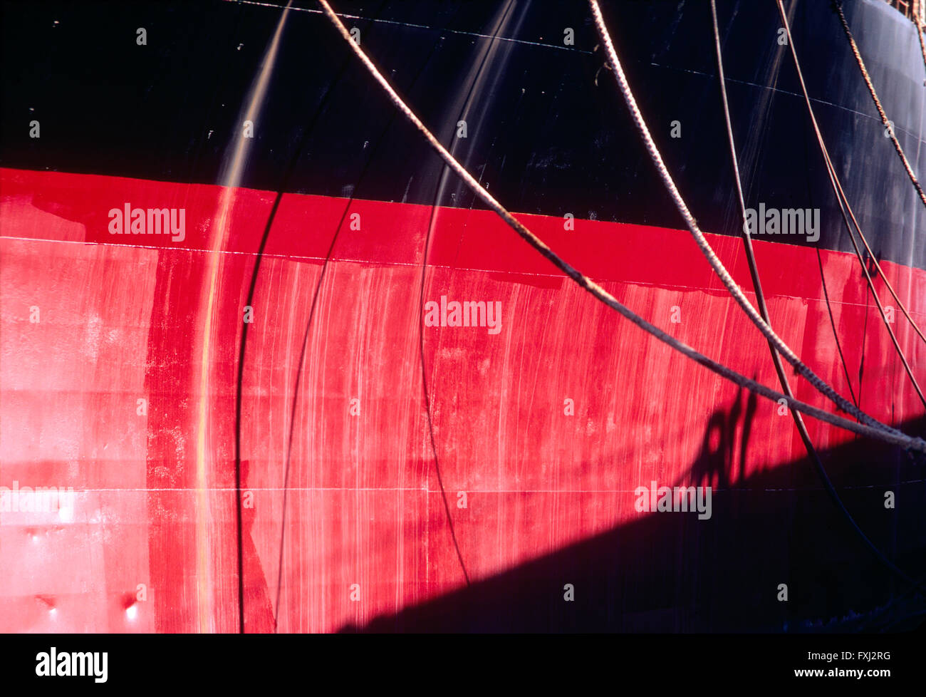Red & black hull of large freighter ship; Genoa; Italy Stock Photo - Alamy