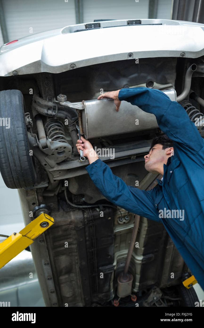 Mechanic repairing a car Stock Photo - Alamy