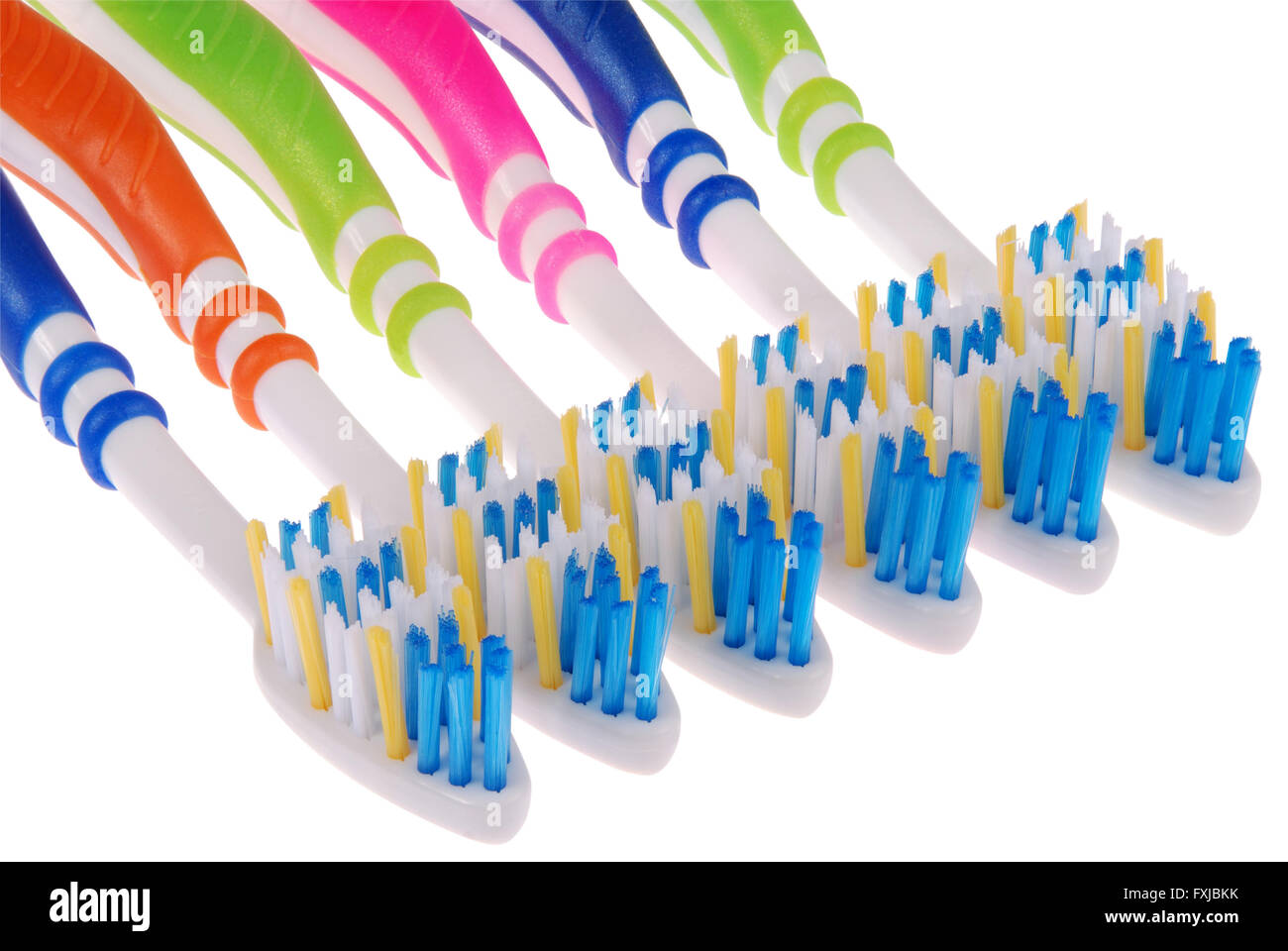 Colored toothbrushes. Isolated on white background. Clipping path ...