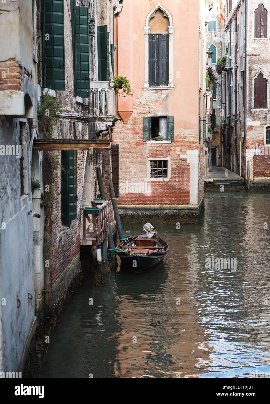 Parked Boat and Gothic Architecture Stock Photo - Alamy