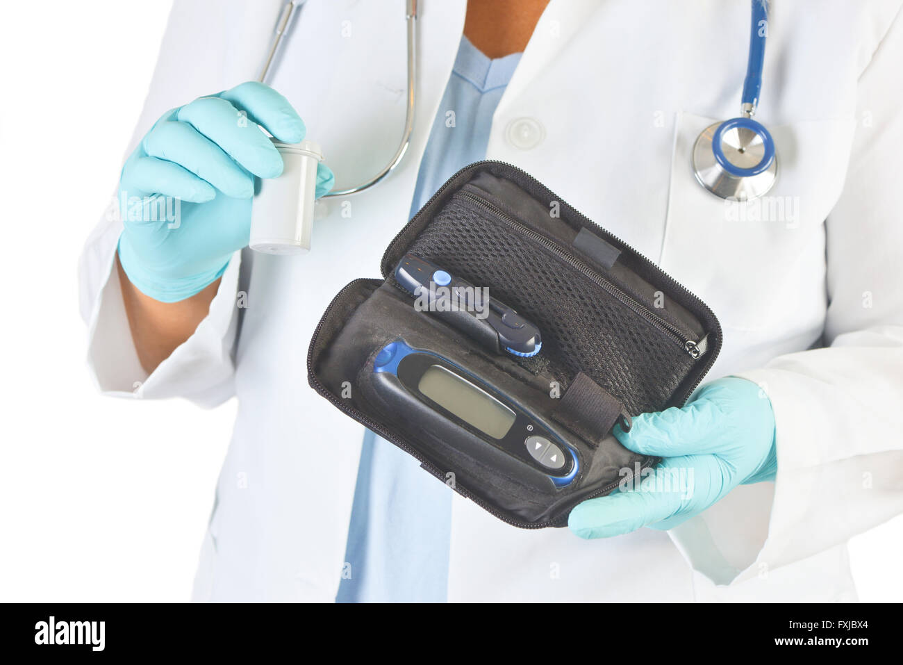 Doctor holds diabetic supply kit prior to giving it to patient Stock ...
