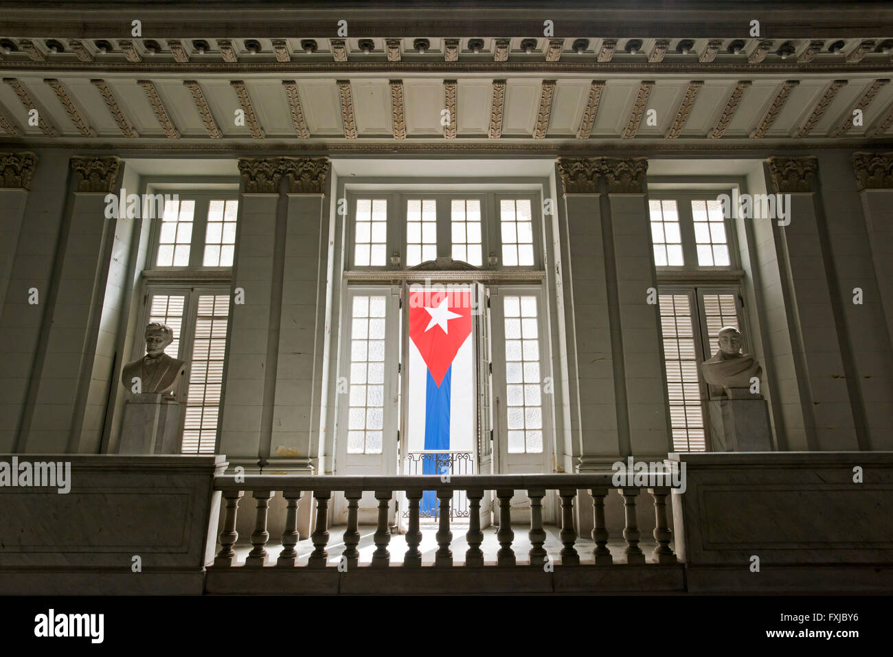 Horizontal view of the Cuban flag flying outside the Revolutionary ...