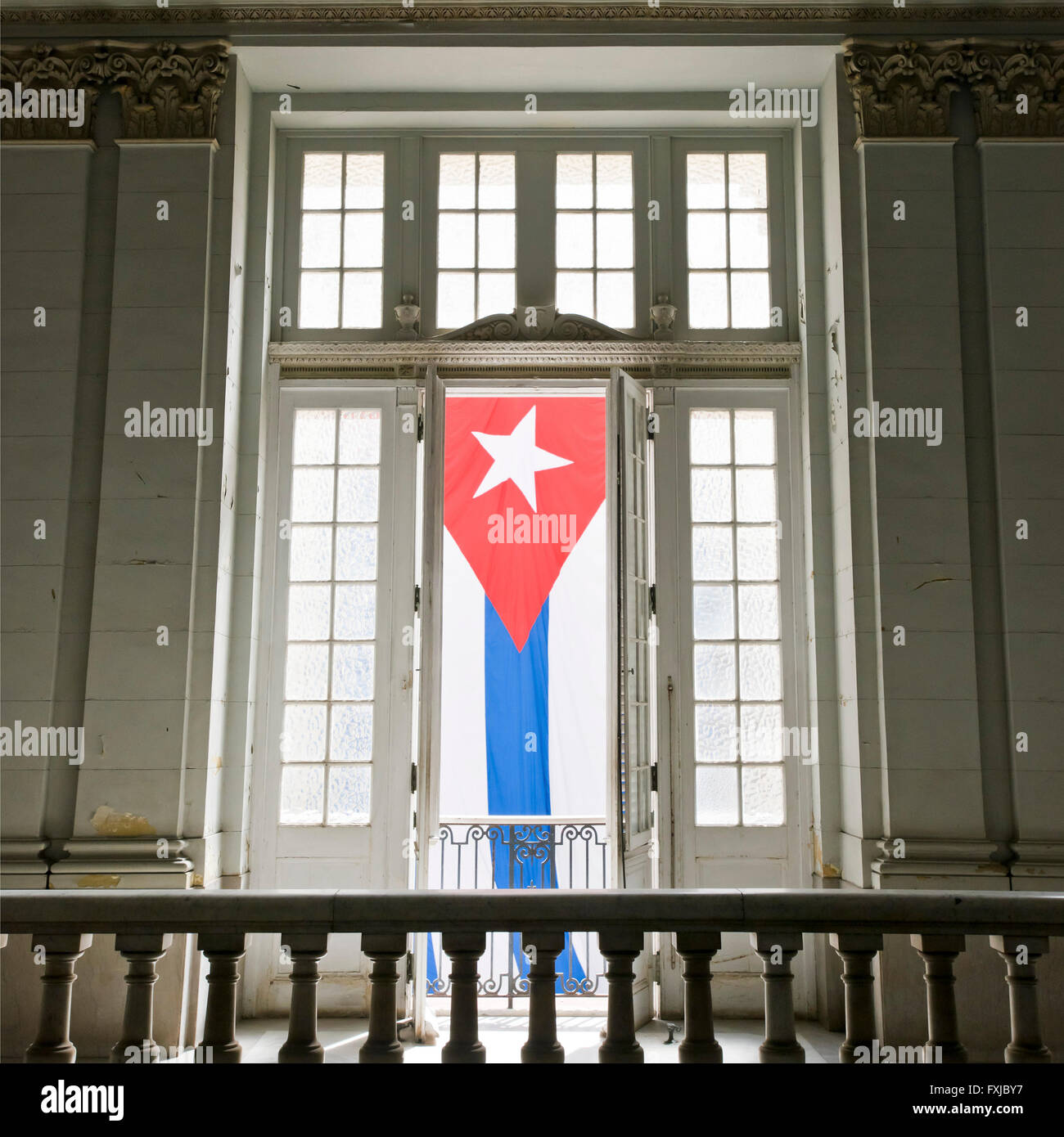 Square view of the Cuban flag flying outside the Revolutionary Museum ...