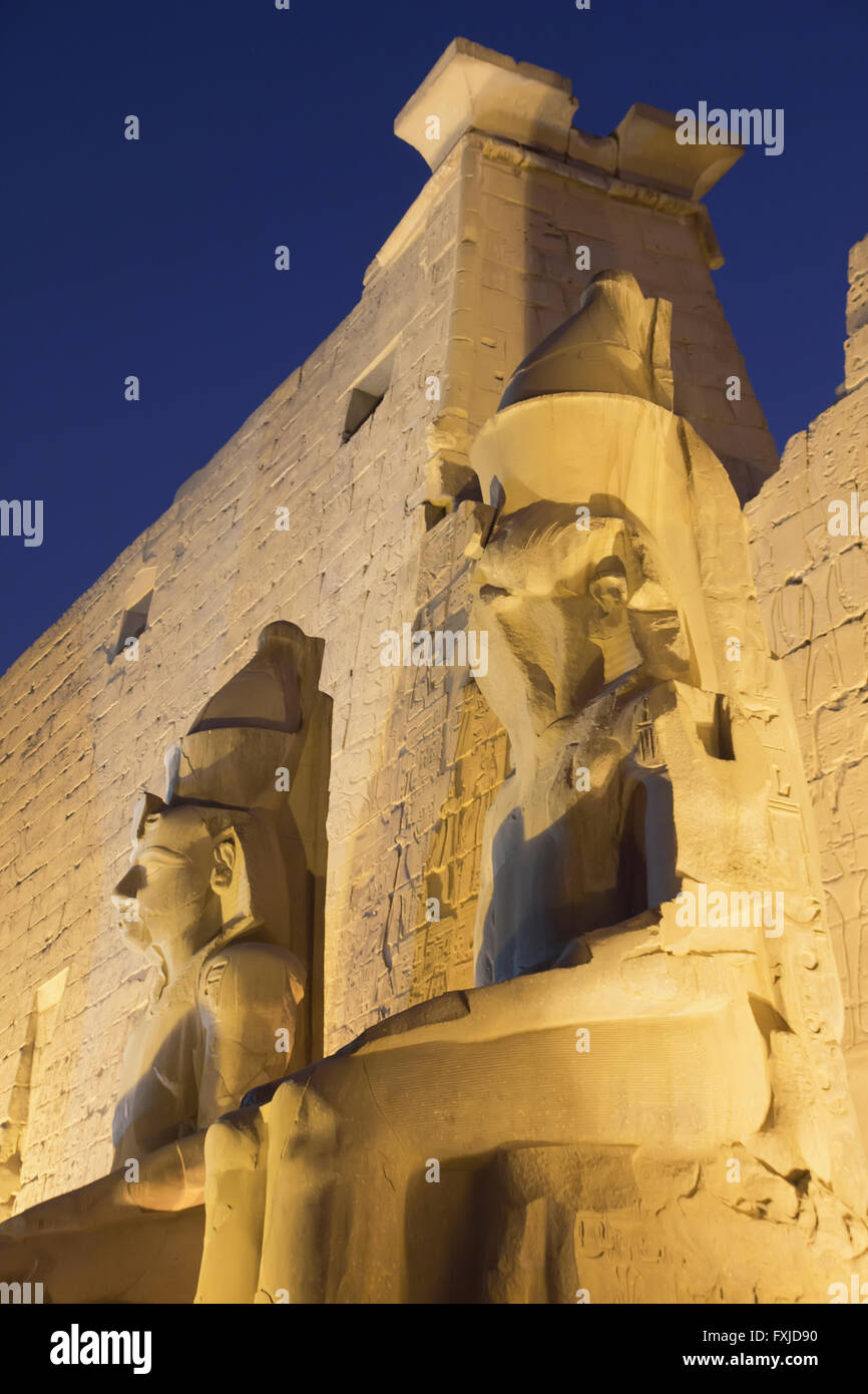Night view of the statue of Ramesses II. Entrance to the Palace Luxor ...