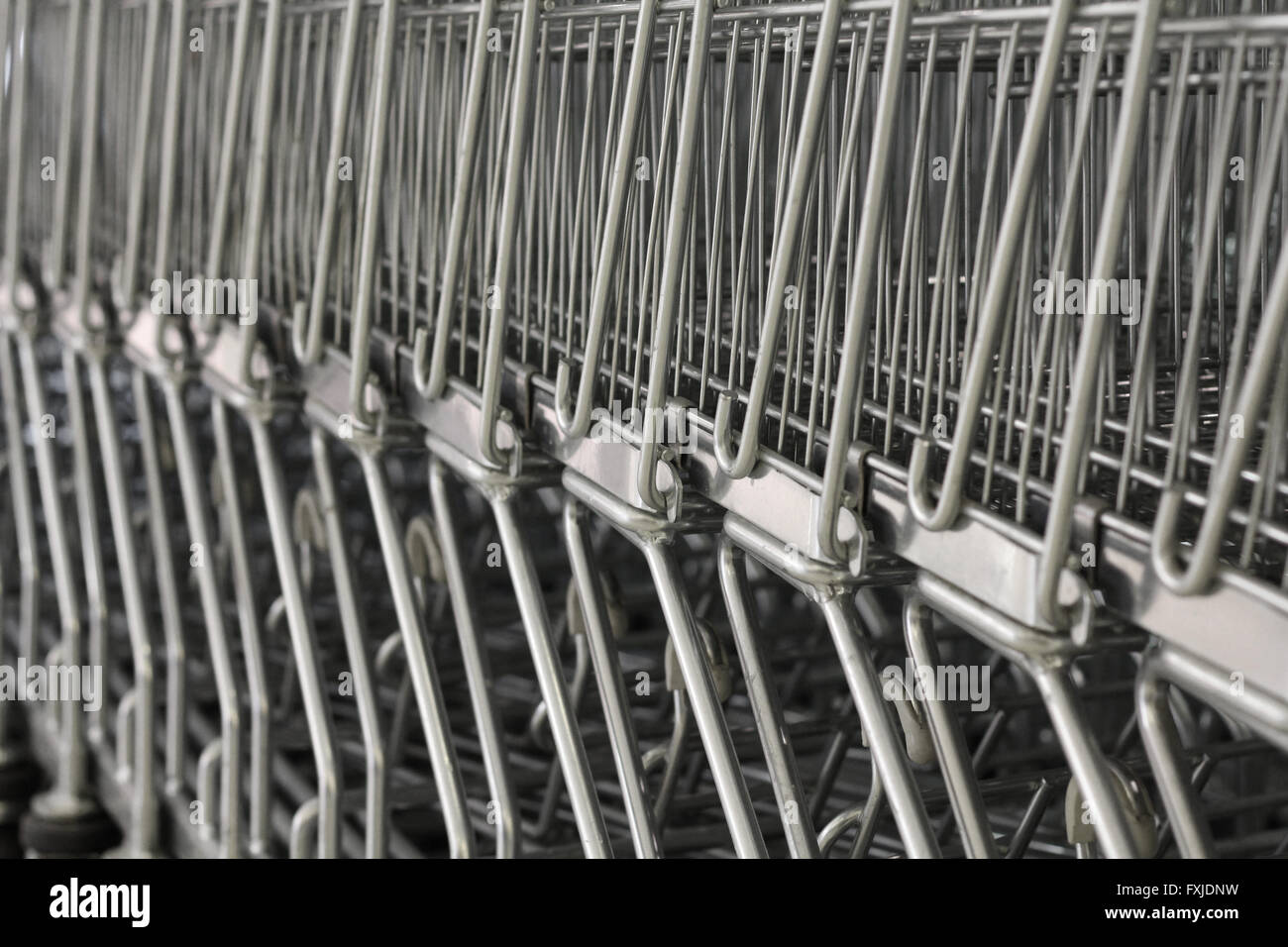 Shopping carts stacked in a abstract form Stock Photo - Alamy