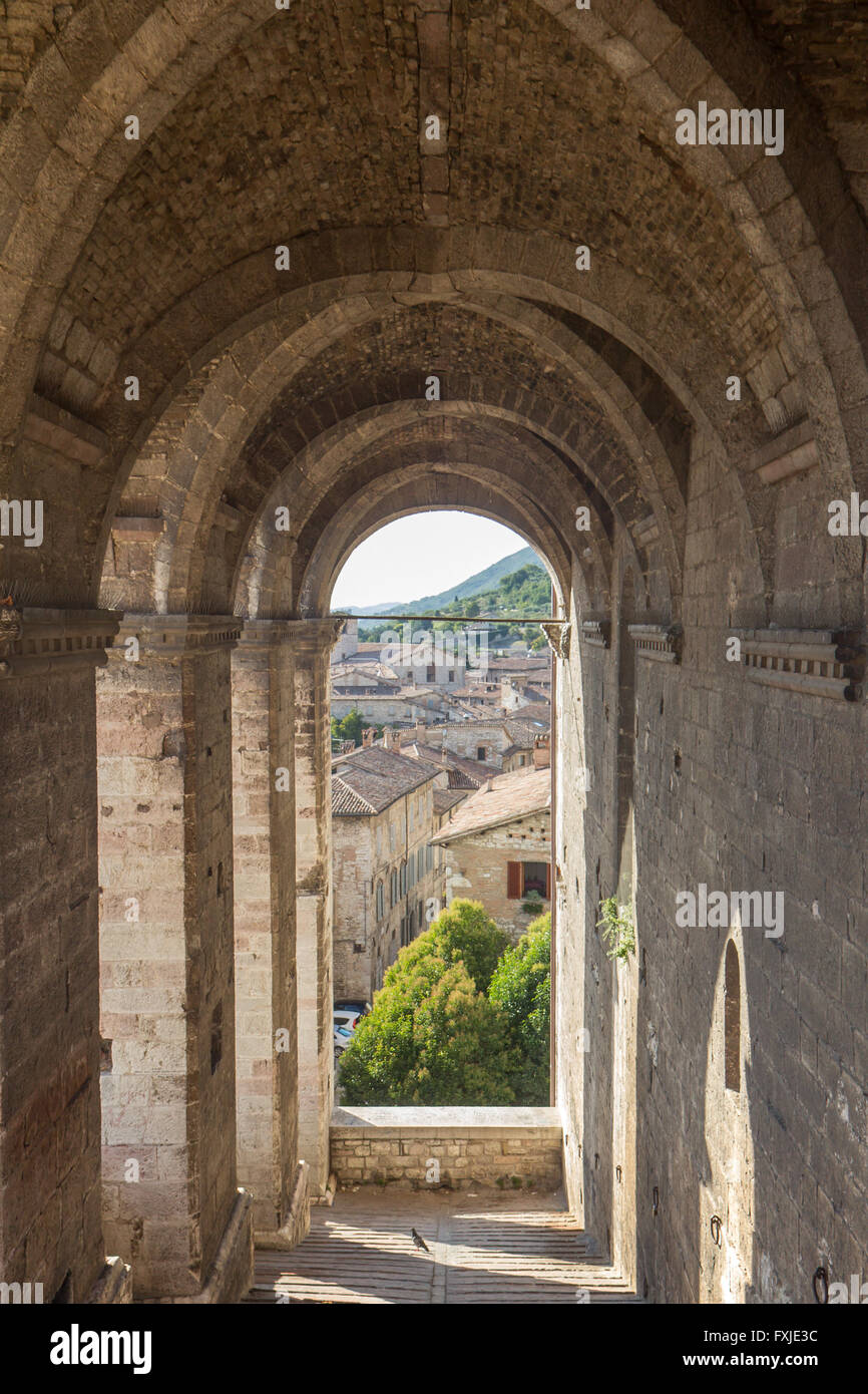 Gubbio cityscape behind an ancient stone arches (Umbria Italy Stock ...