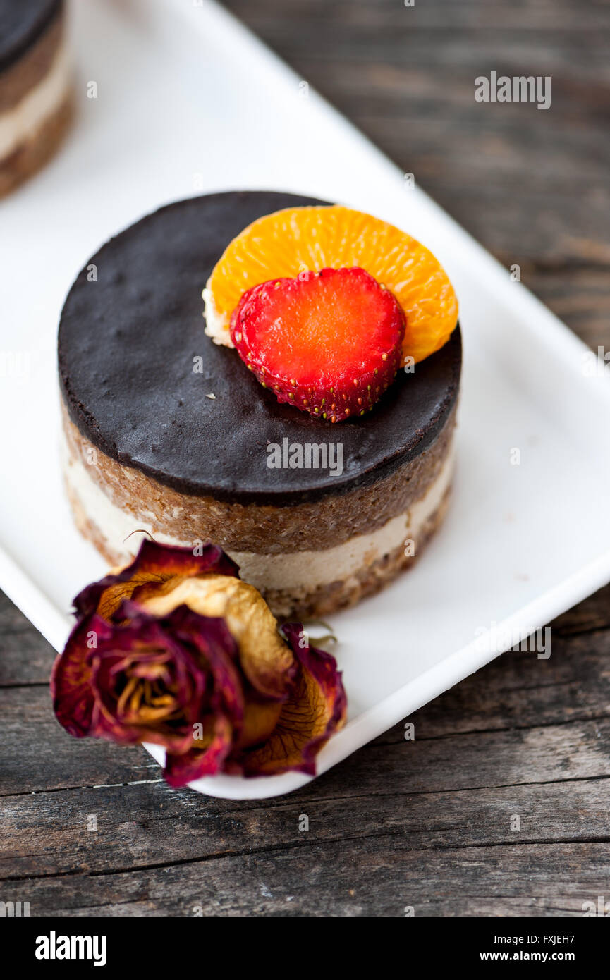 Raw vegan cake with chocolate Stock Photo - Alamy