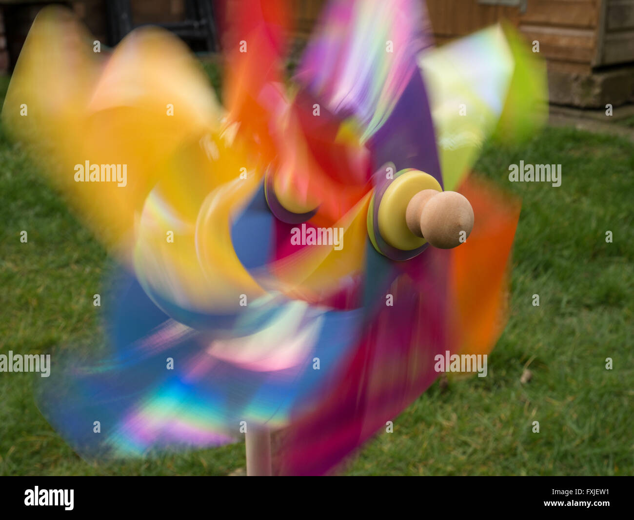 Garden windmill spinning in the wind Stock Photo - Alamy