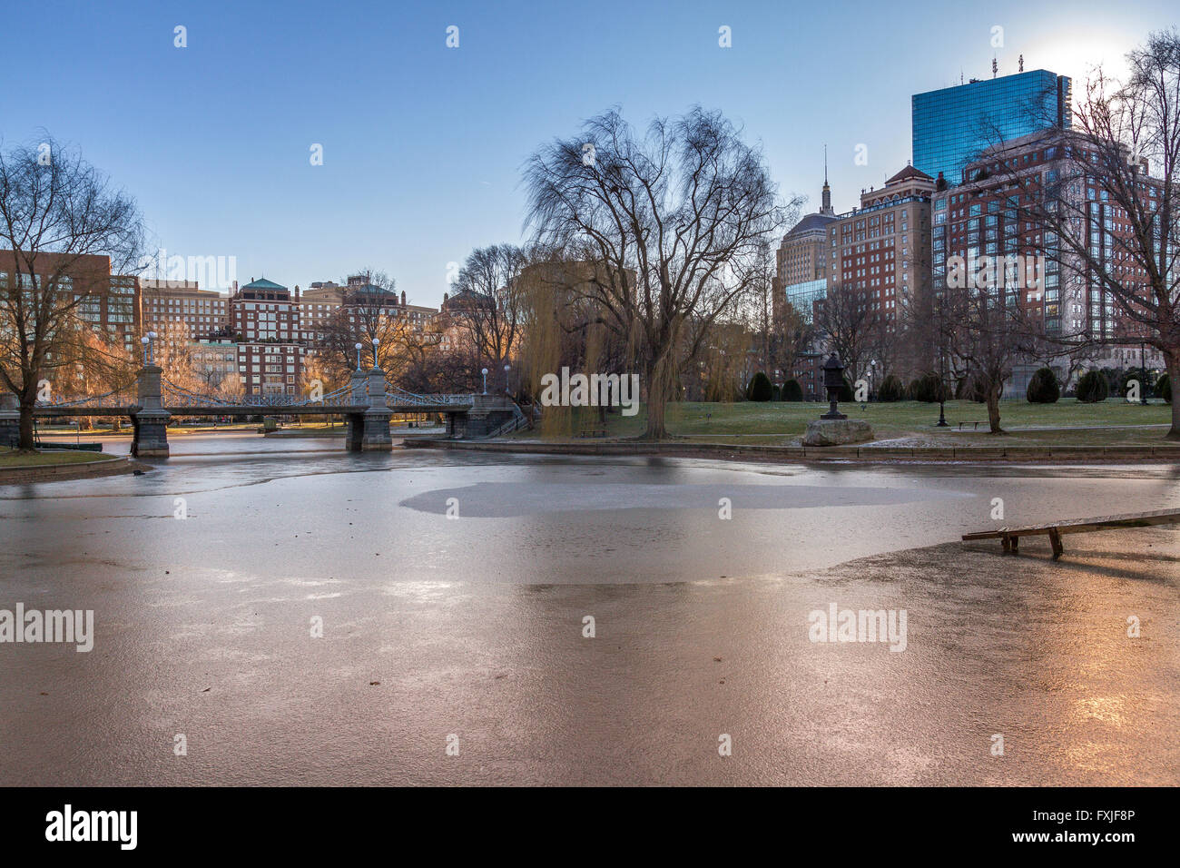 Boston Public Garden lake frozen over in Wintertime Stock Photo - Alamy