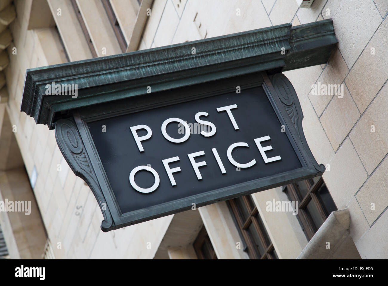 Post Office Sign on Building Facade Stock Photo - Alamy
