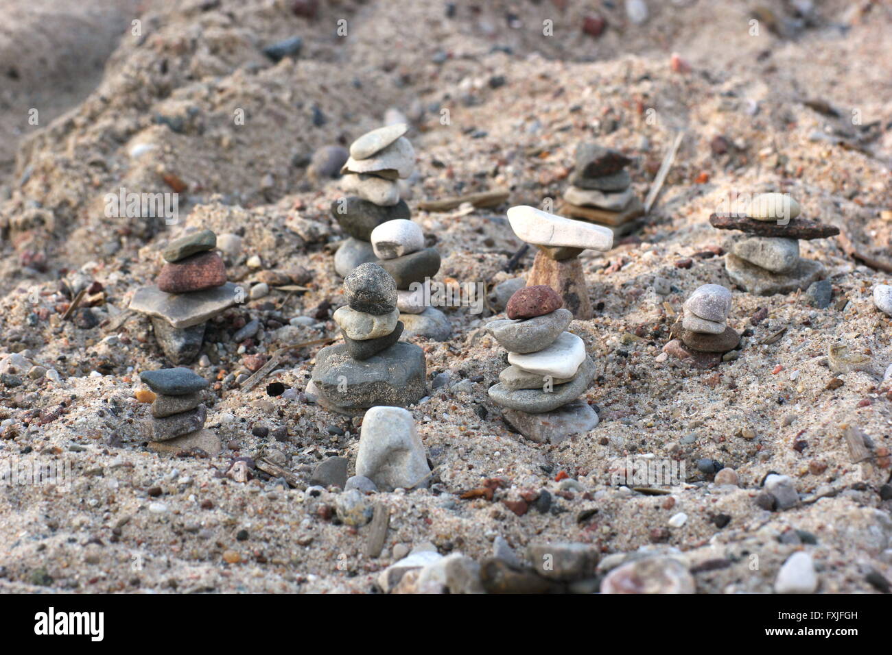 Stone piles at the beach Stock Photo - Alamy