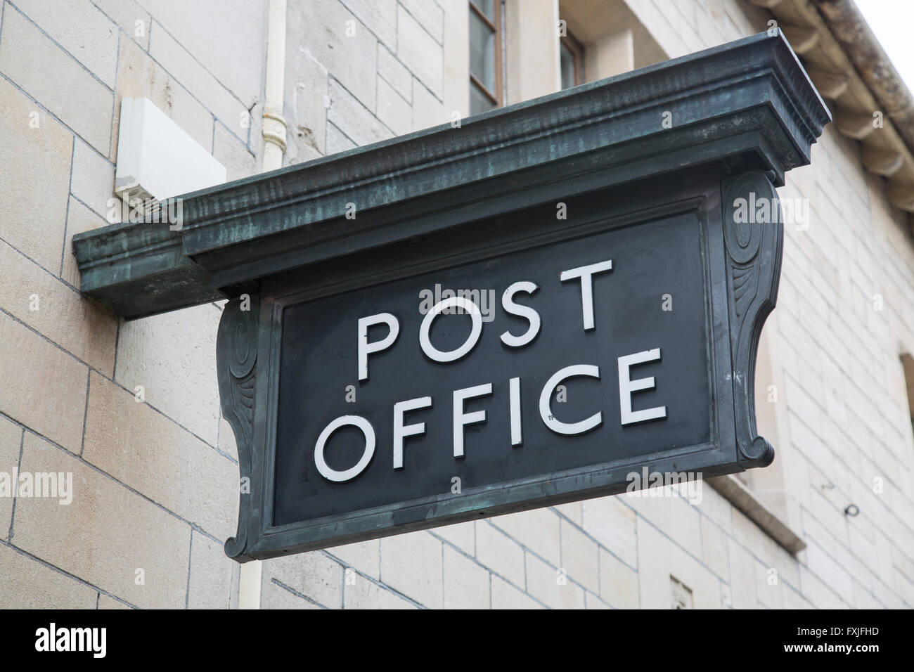 Post Office Sign on Building Facade Stock Photo - Alamy