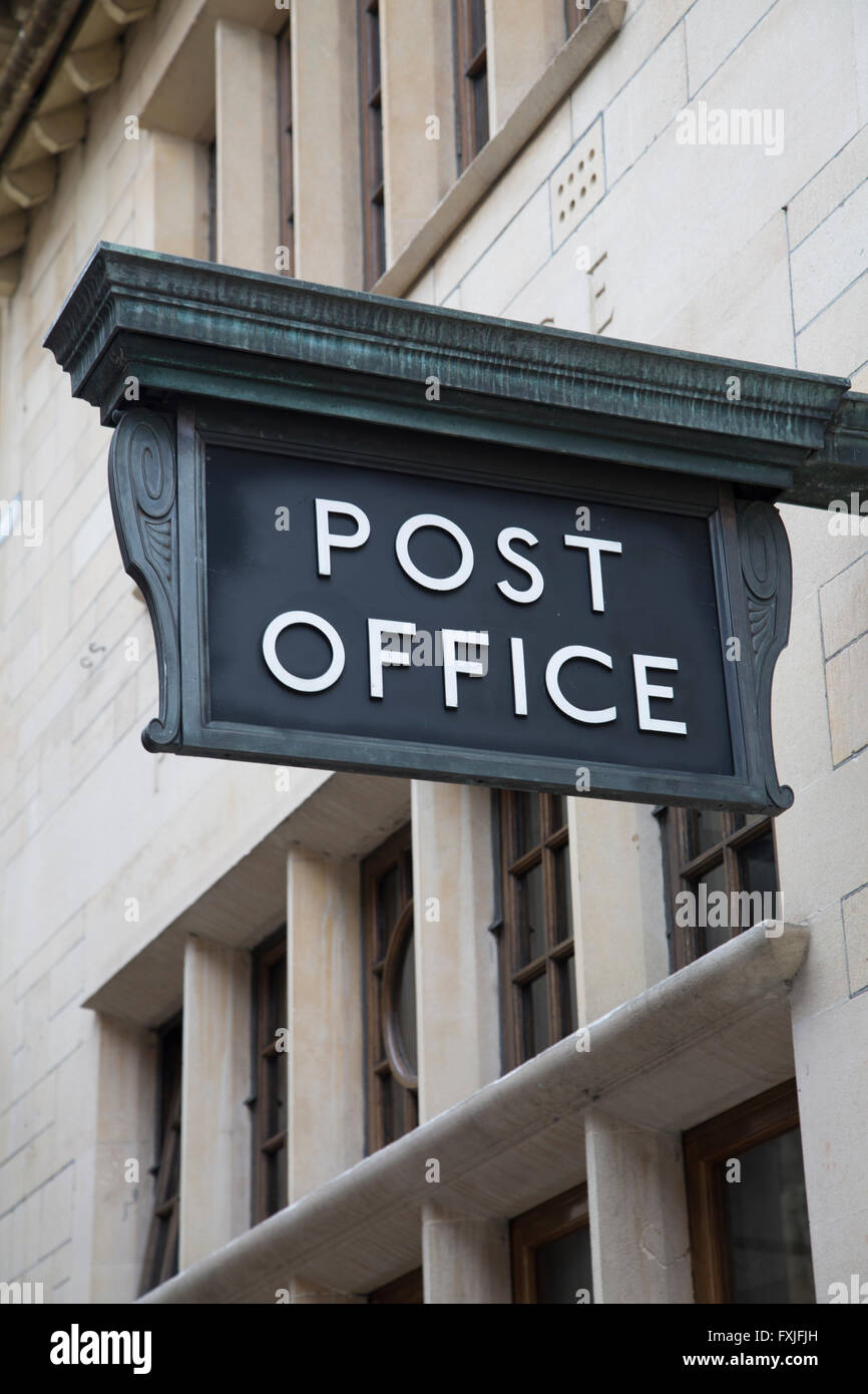 Post Office Sign on Building Facade Stock Photo - Alamy