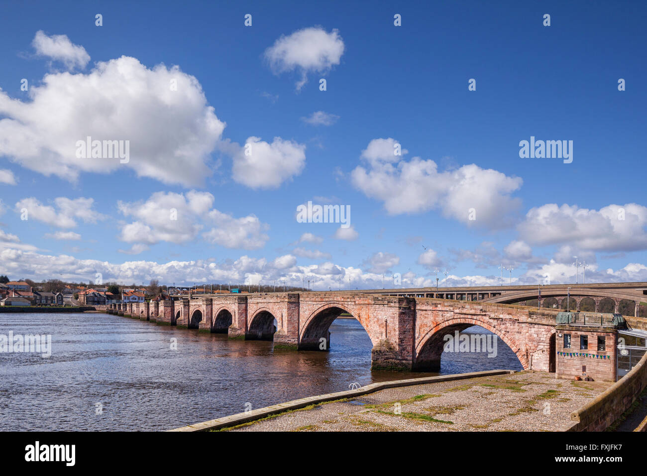 Berwick Old Bridge on the River Tweed, and beyond it the Royal Tweed ...
