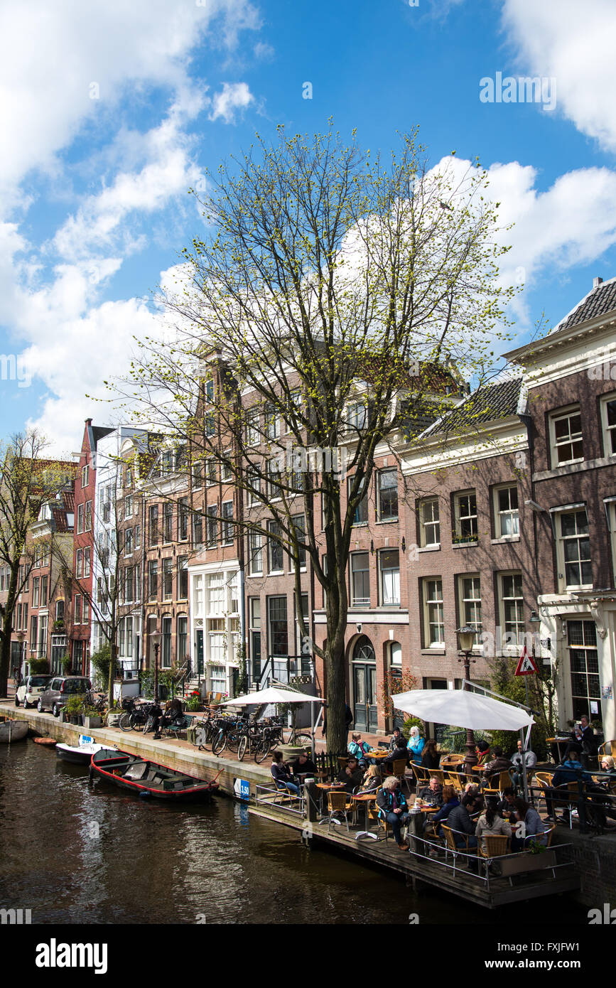 facades of historic buildings alongside the canals in amsterdam holland ...