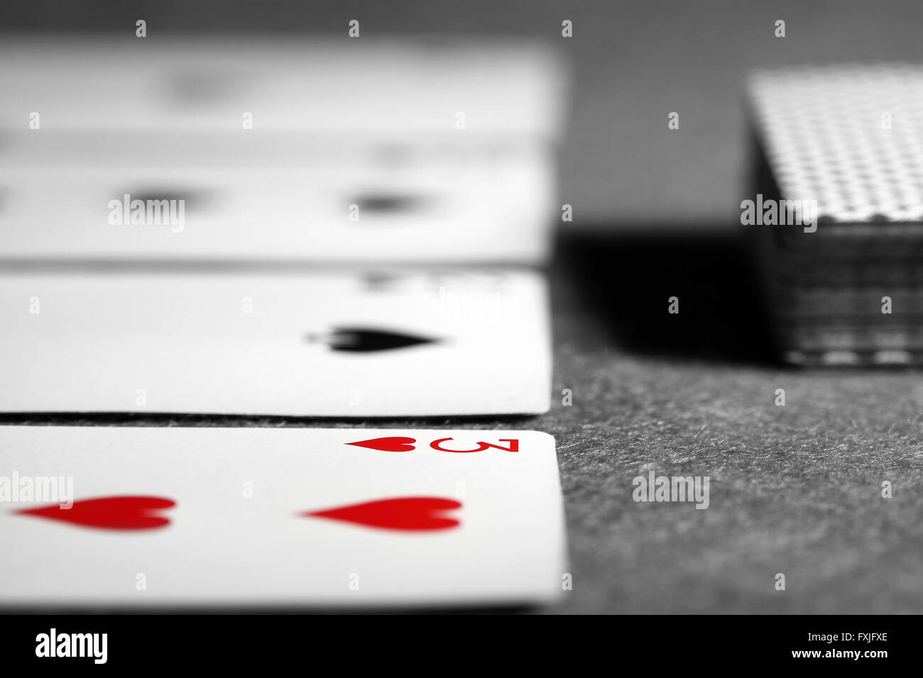 Row of cards selective color Stock Photo - Alamy