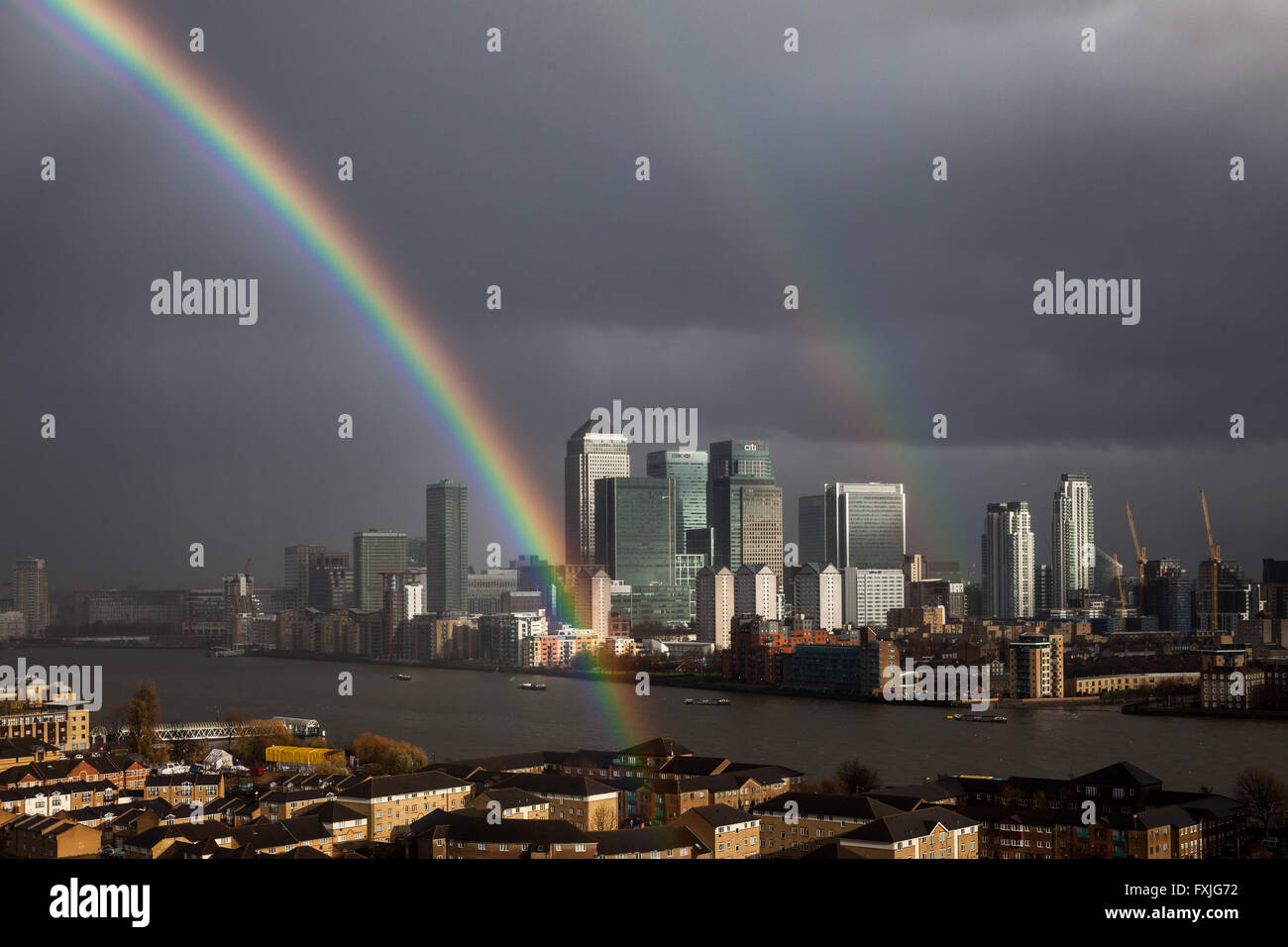 A colourful rainbow over south east London including Canary Wharf ...