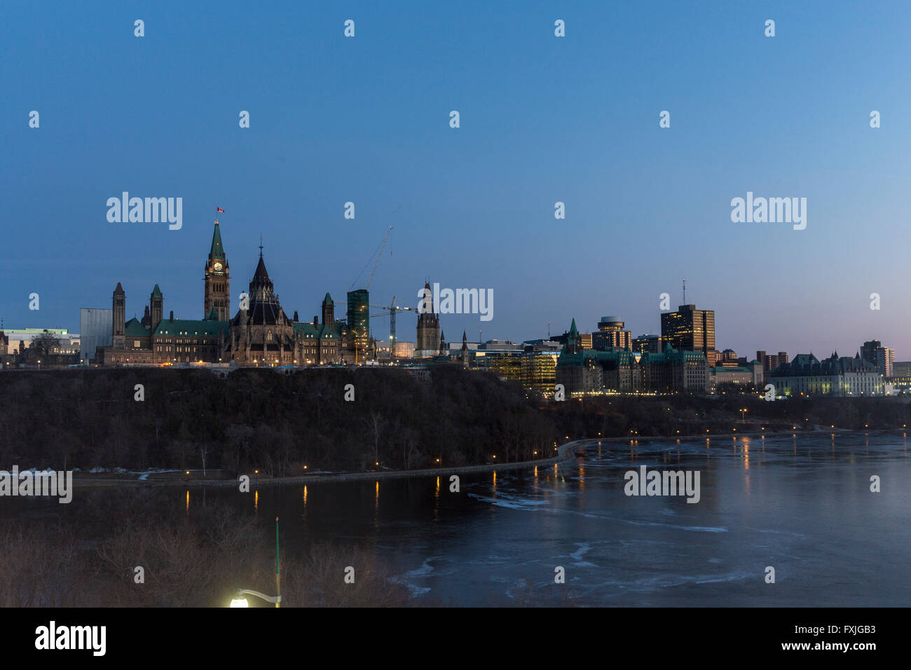 City scape at dusk landscape with river, buildings and bridge Stock ...