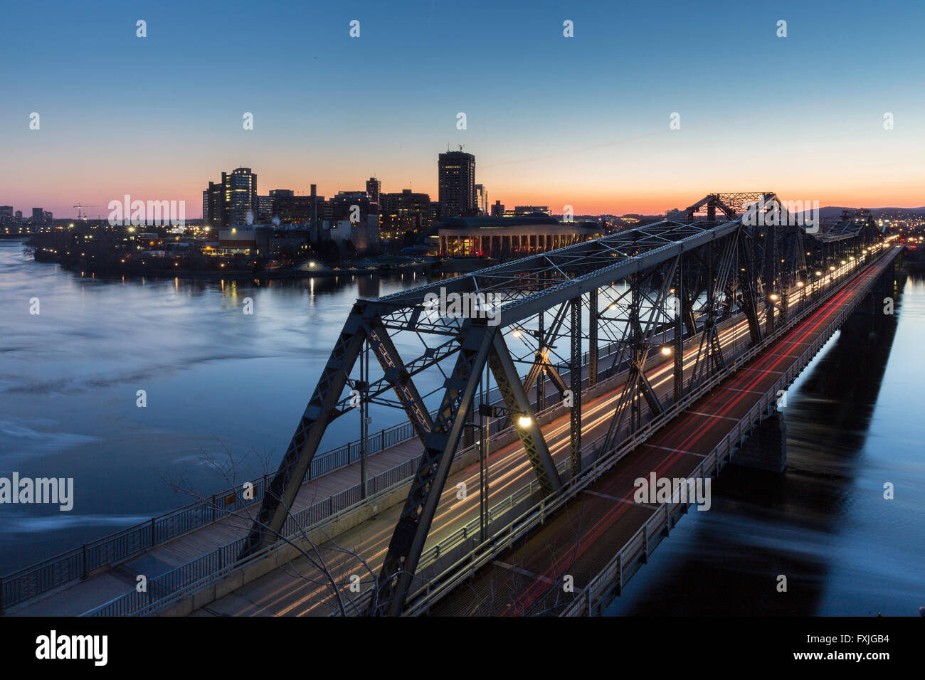 City scape at dusk landscape with river, buildings and bridge Stock ...