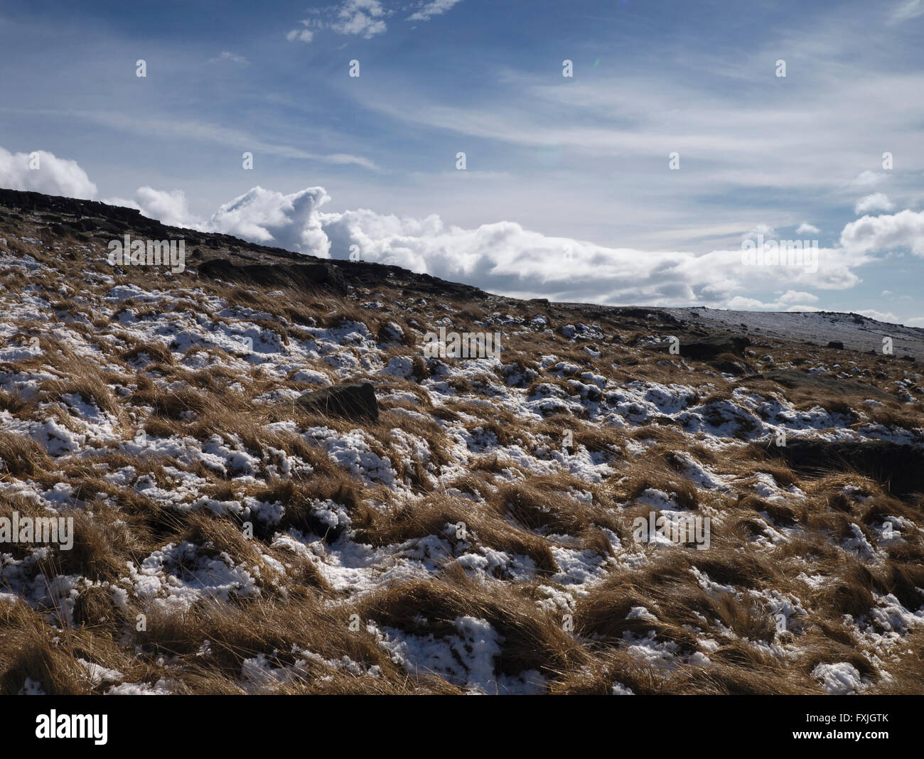 The Pennine Way at Standedge Edge with an early Spring snowfall Stock ...