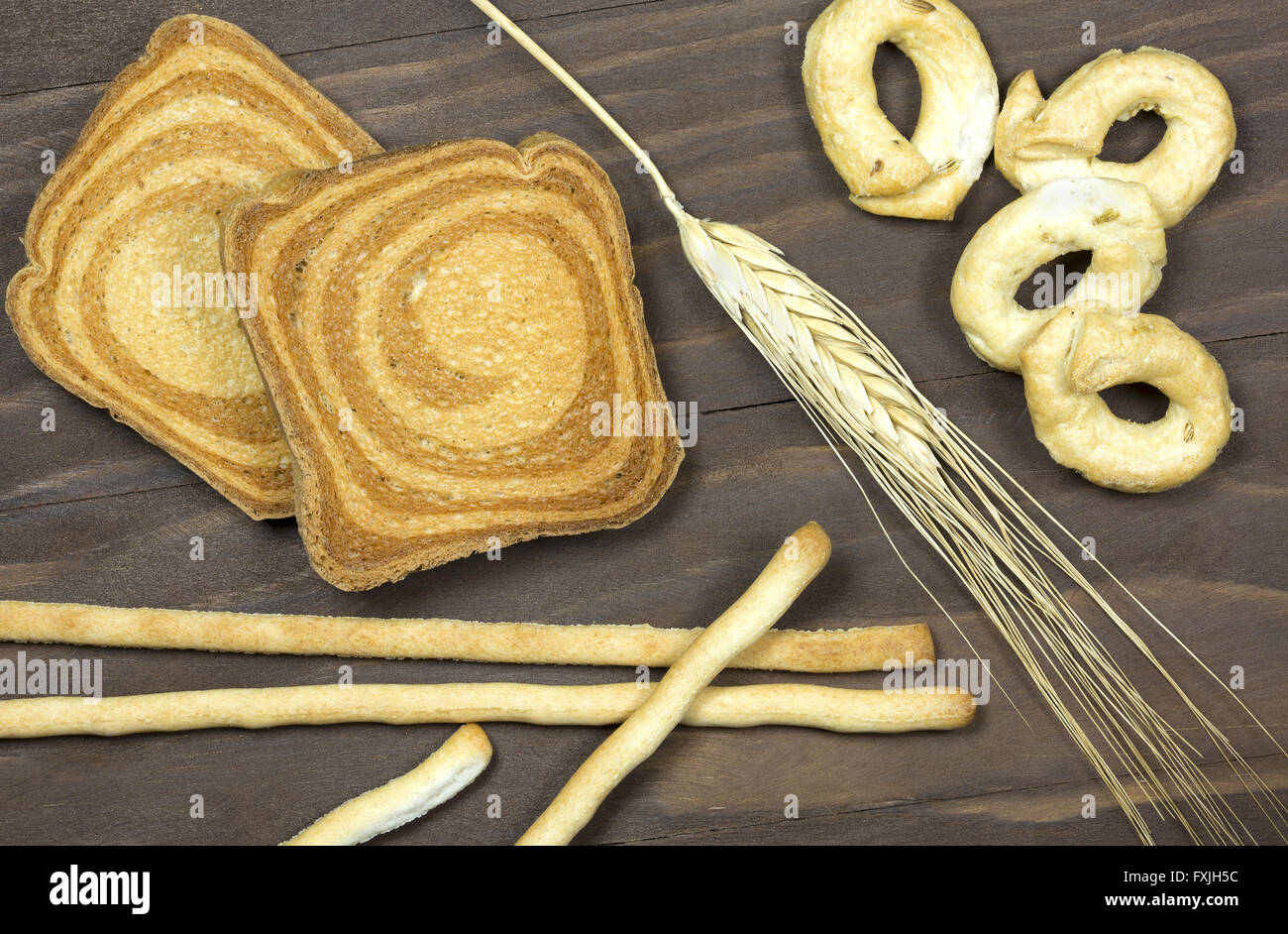 Bakery products on wooden background Stock Photo - Alamy