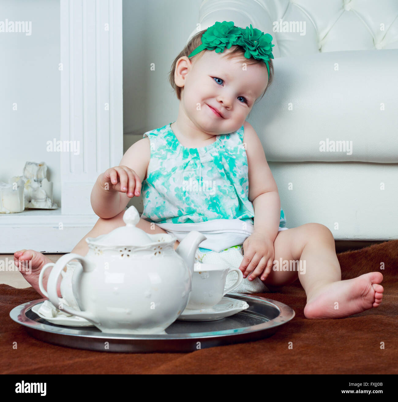 cute one year old baby drinking tea at home Stock Photo - Alamy
