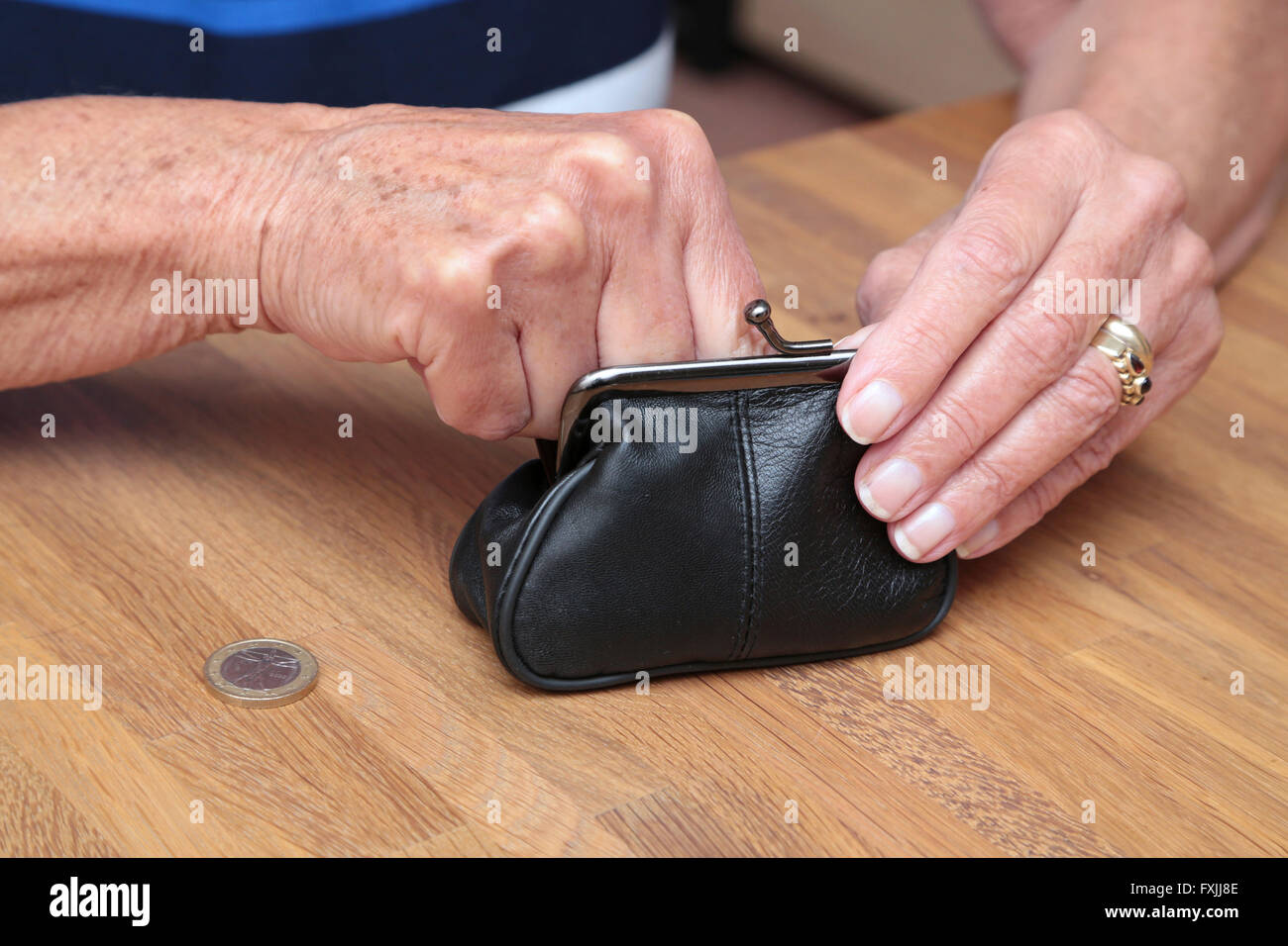 Money elderly hi-res stock photography and images - Alamy