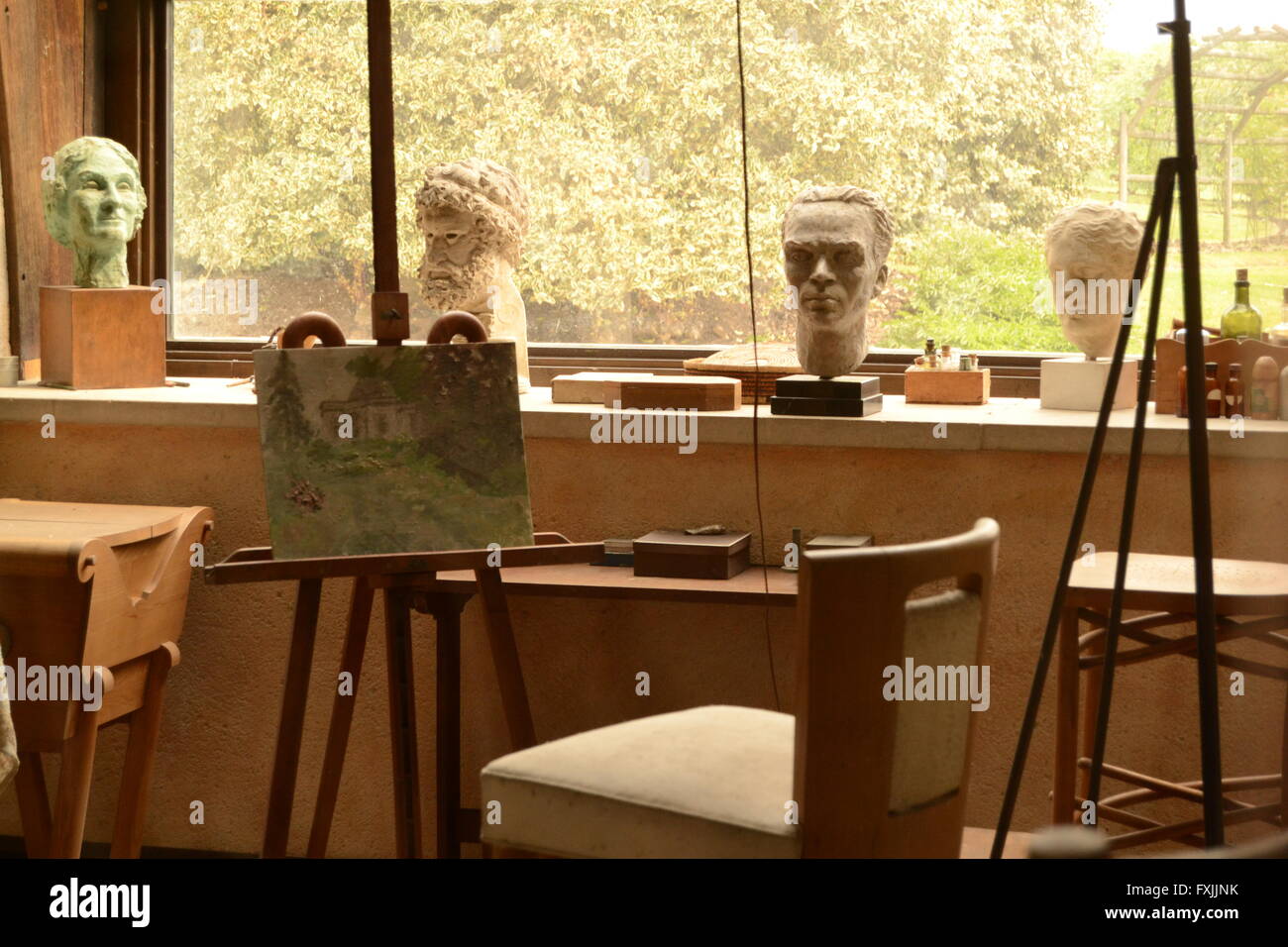 a still life composition, artist studio with windows and canvas, chair ...