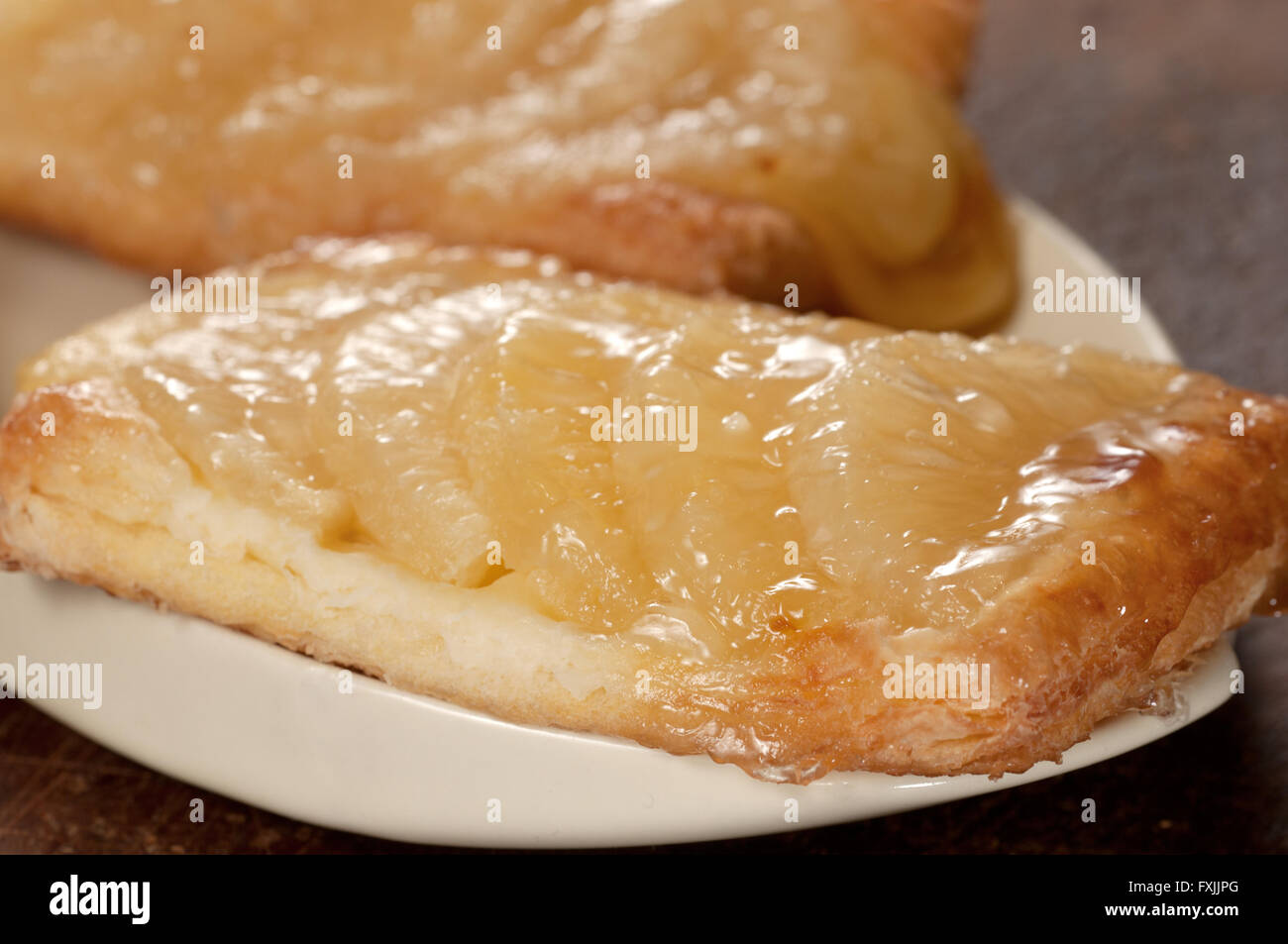 Flaky cake with pineapple, close up shot Stock Photo - Alamy