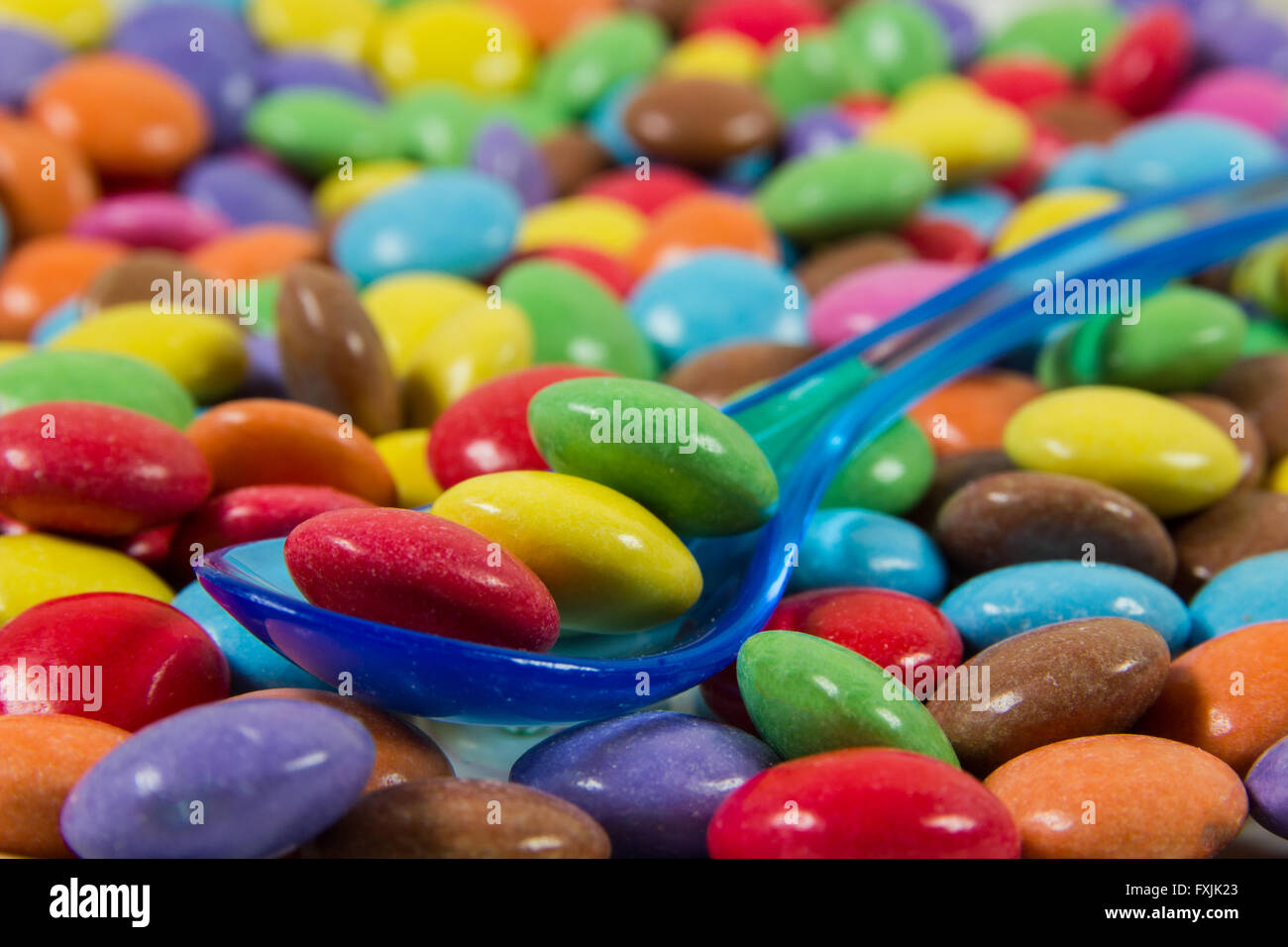 Many colorful chocolate Stock Photo - Alamy