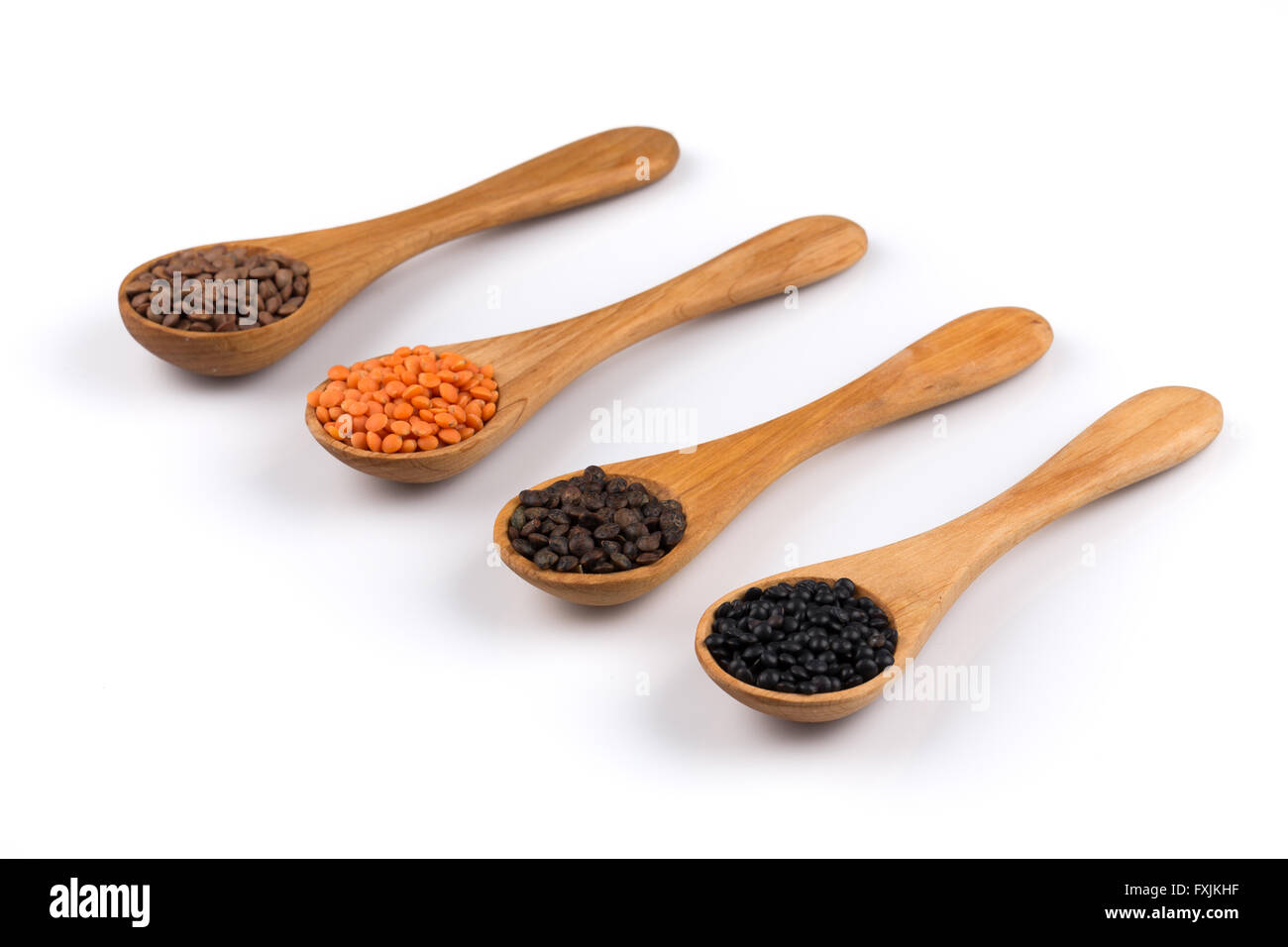 Group of lentils isolated on white background Stock Photo - Alamy