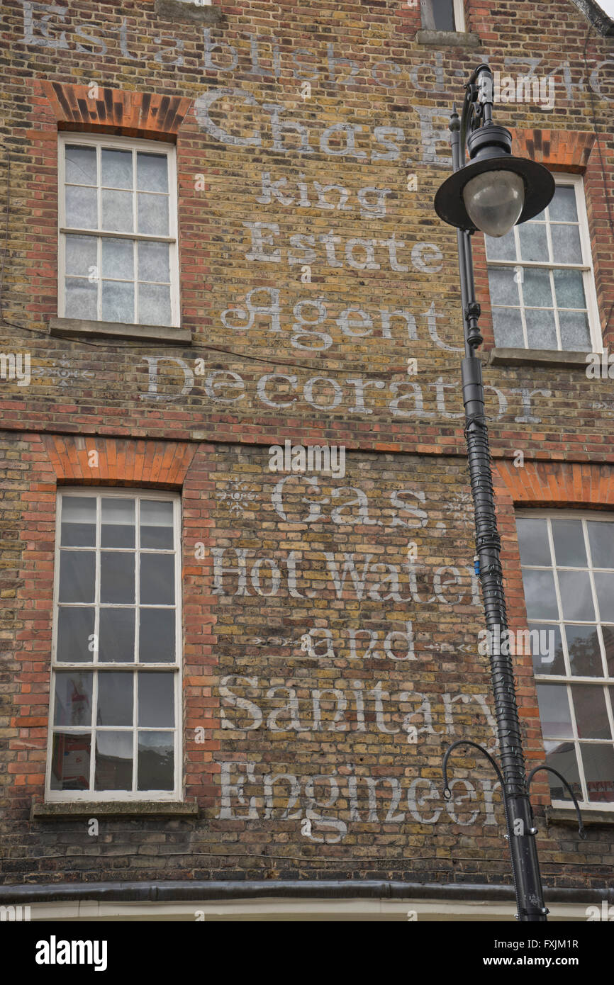 Old signs remaining in traditional buildings in Hampstead Village ...