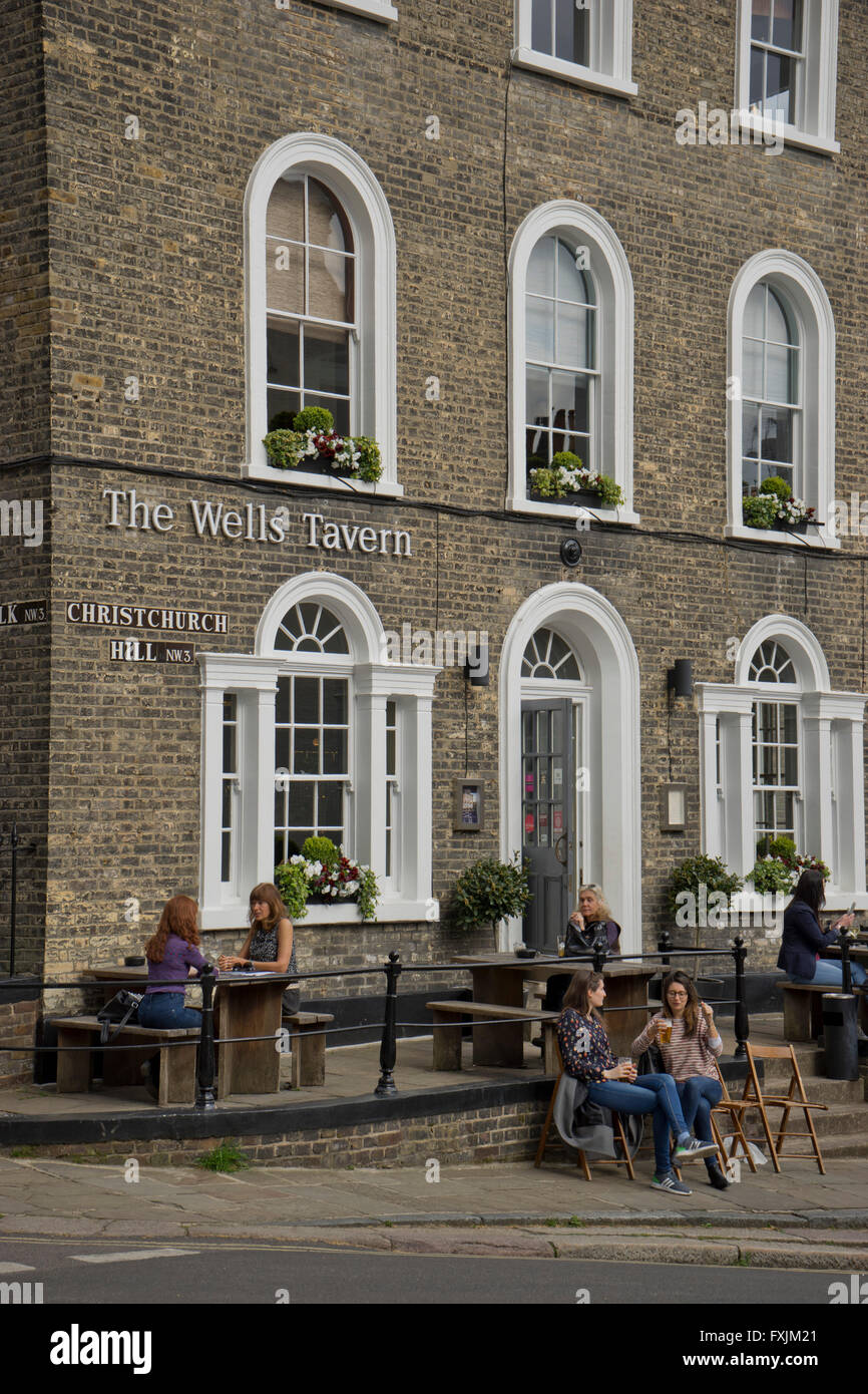 People sit outside pub in Hampstead Village. London, England, UK Stock ...