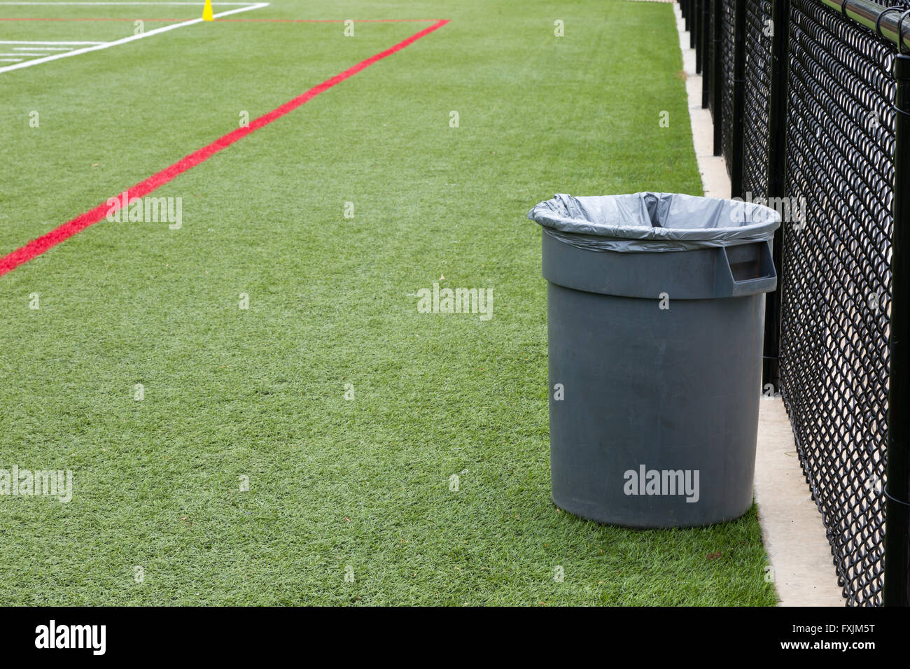 Throwing garbage in trash bin hi-res stock photography and images - Alamy