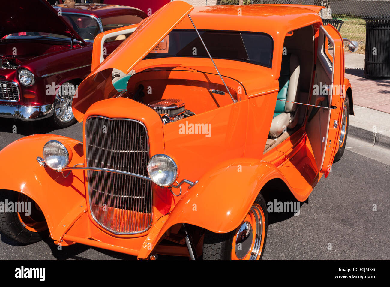 Custom orange two door hot rod Stock Photo - Alamy