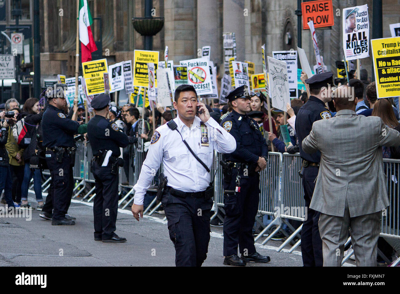 Line of Command- An NYPD shift commander walks the line of protesters ...