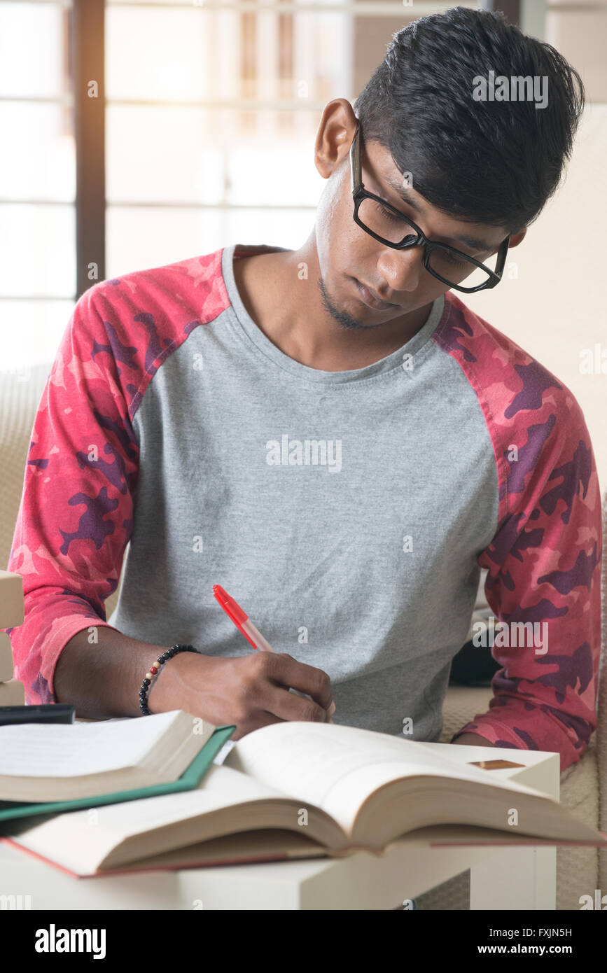 indian college student doing homework Stock Photo - Alamy