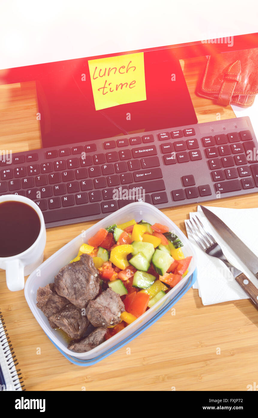 eating at workplace Stock Photo - Alamy