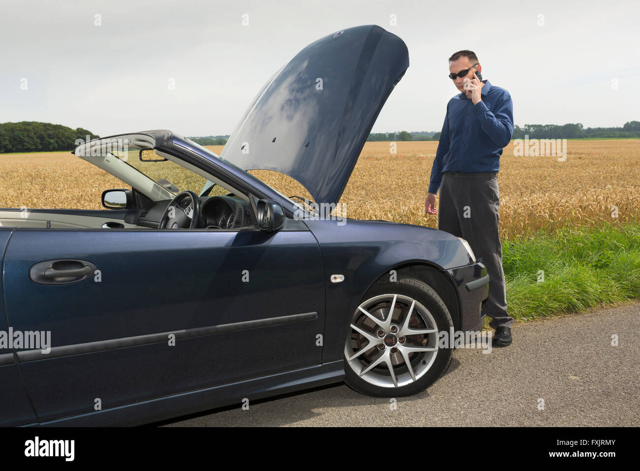 Man waiting beside car open hi-res stock photography and images - Alamy