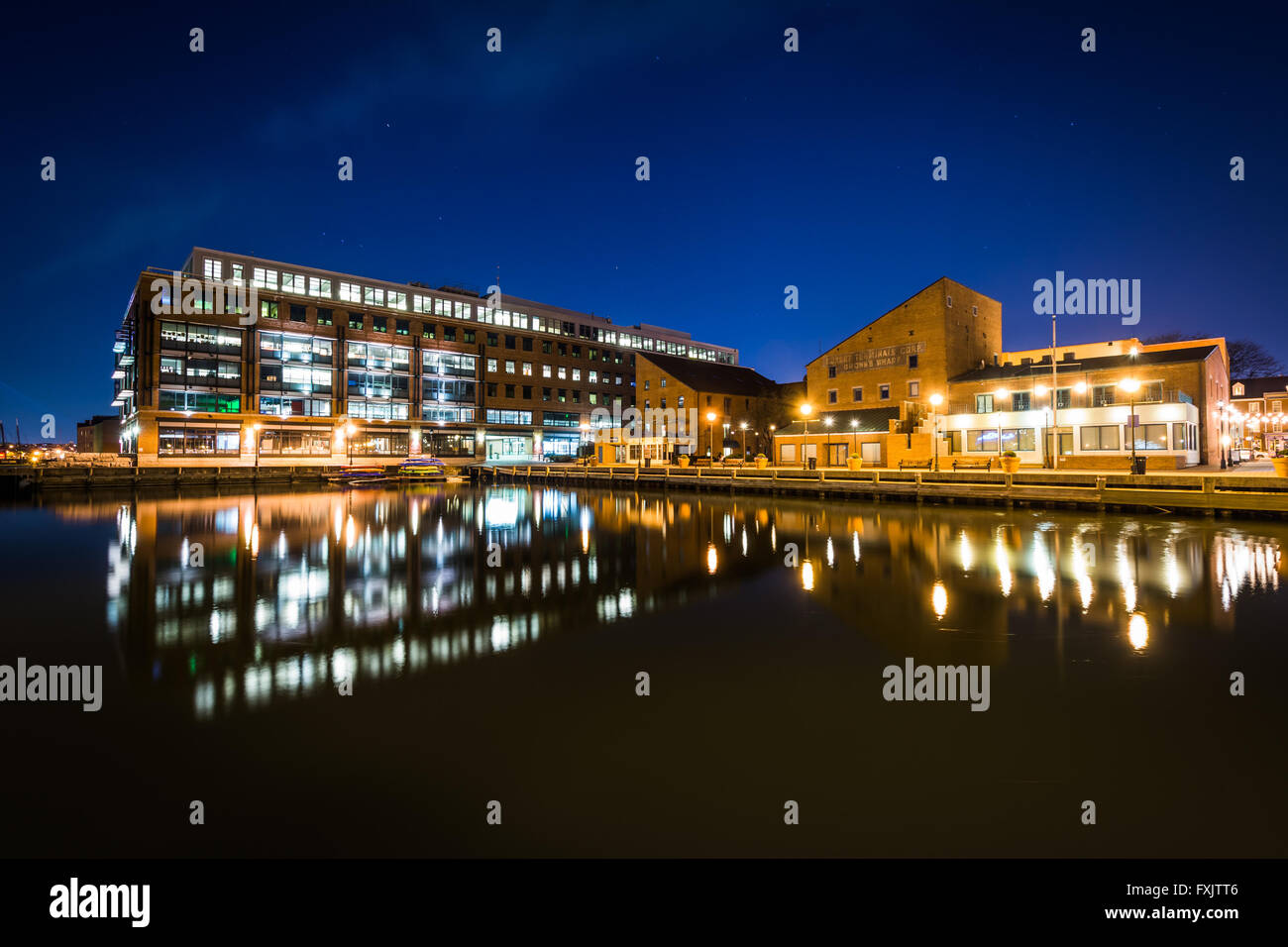 Buildings on the waterfront in Fells Point at night, in Baltimore ...