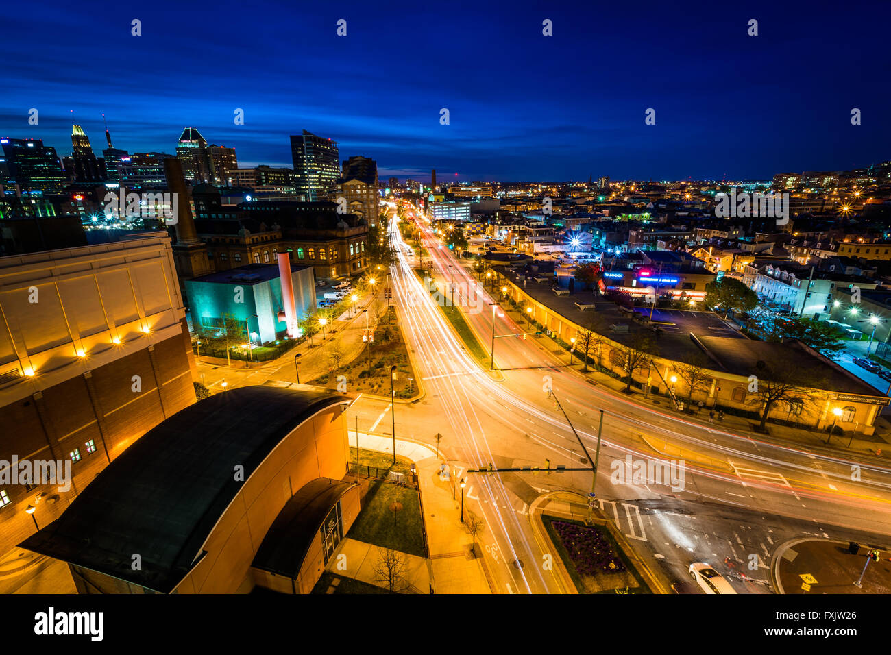 View of Presidents Street at night, in downtown Baltimore, Maryland ...